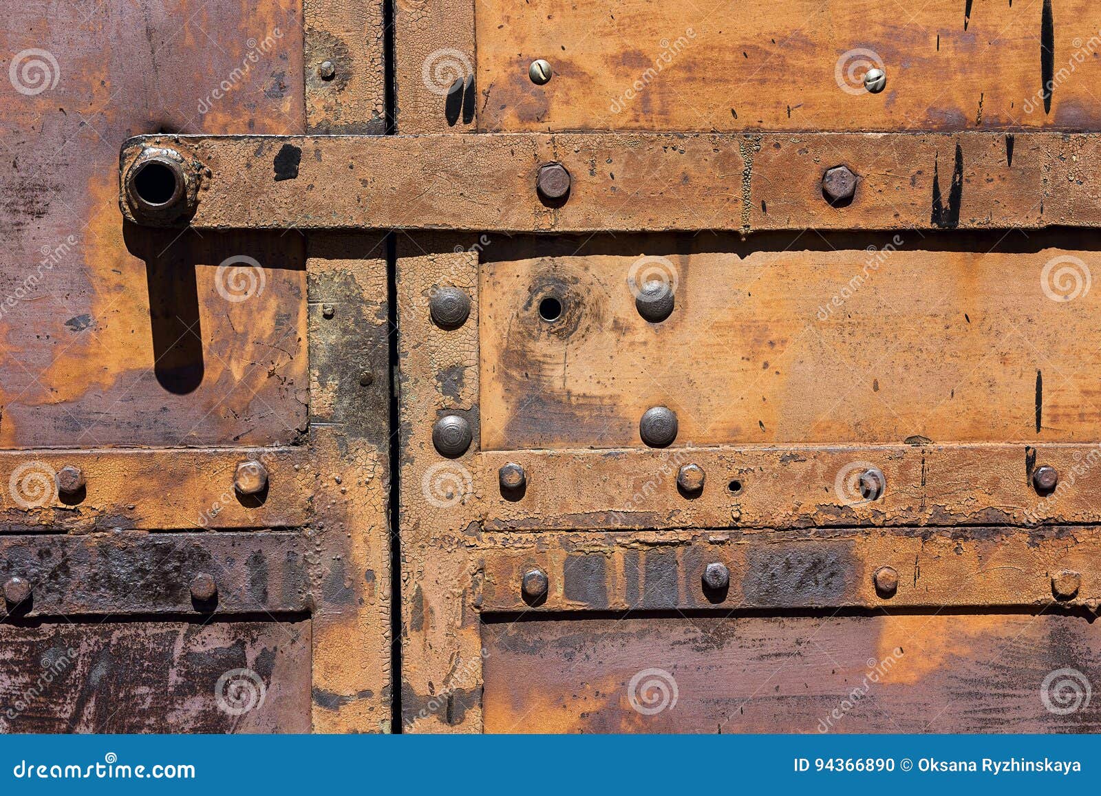Fragment of Old Rusty Iron Gates with Rivets. Stock Photo - Image of ...