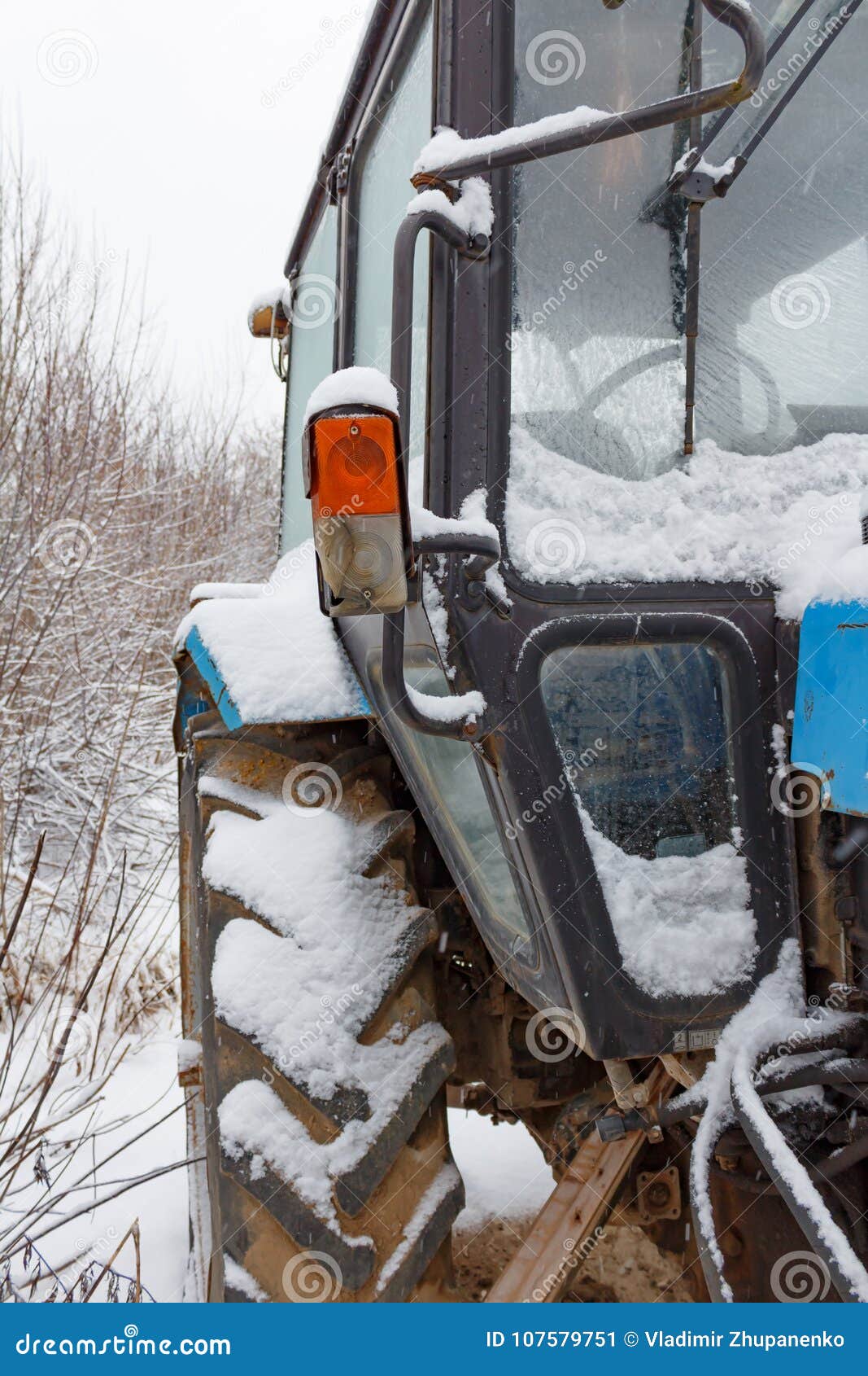 Fragment of the Old Tractor Cab Covered with Snow. Front View Stock ...