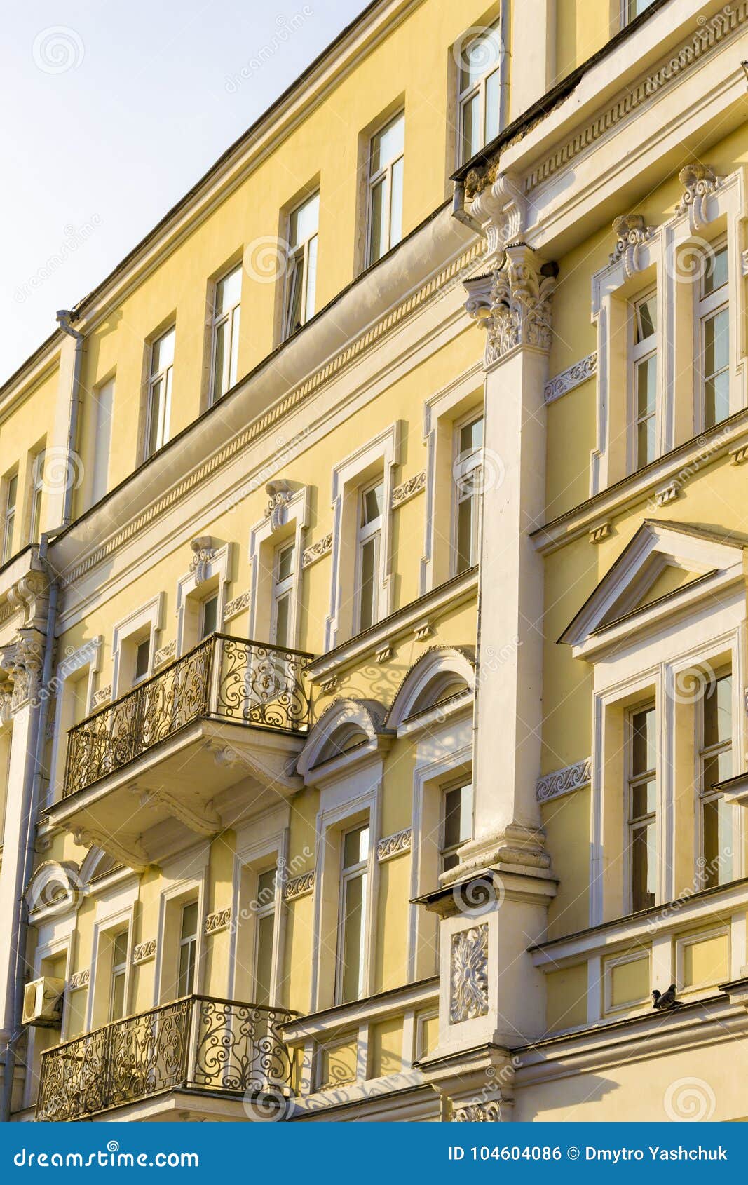Fragment of Old Yellow Building with Balconies Stock Photo - Image of ...