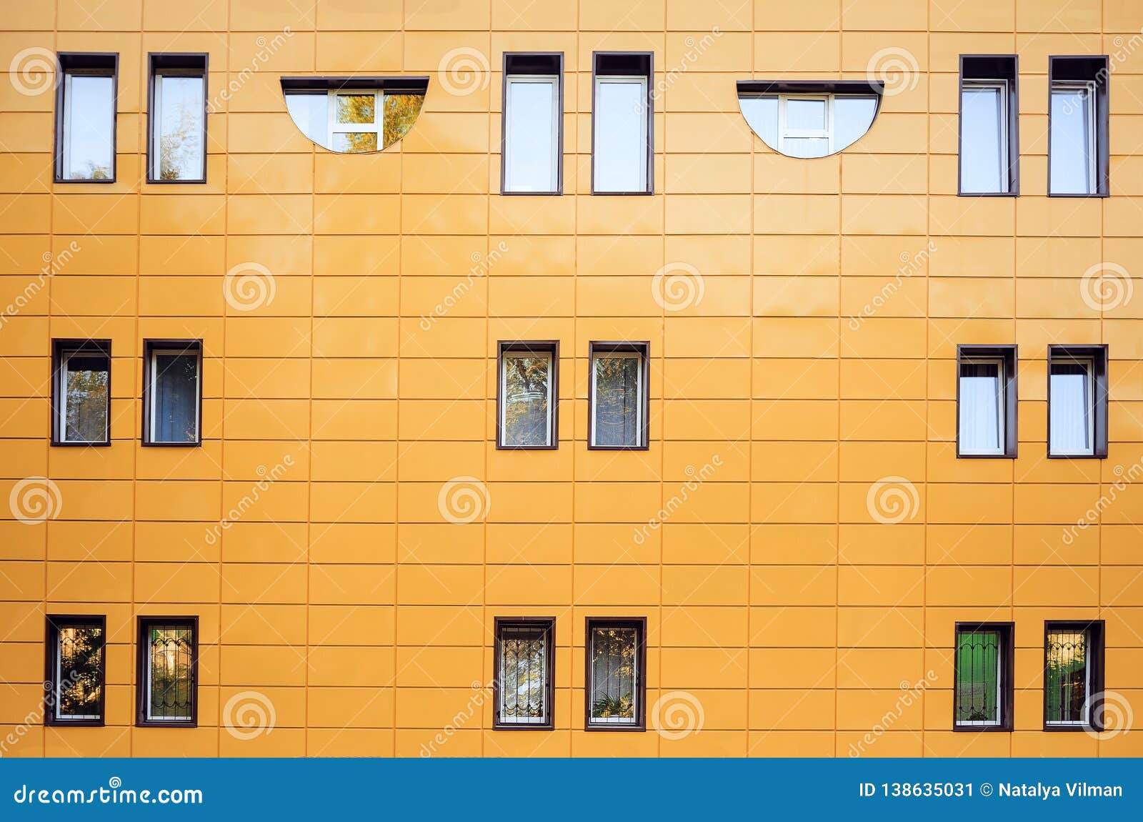 Fragment of a Orange Wall with Windows. Front View Stock Image - Image ...