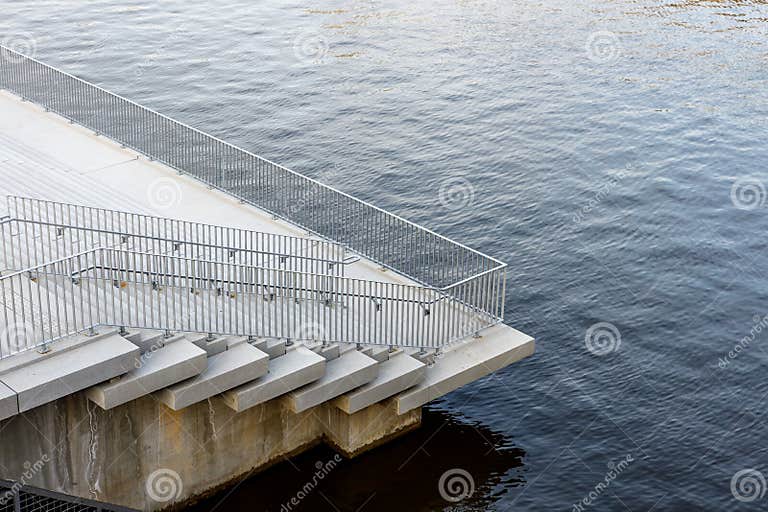 A Fragment of the Steps Going into the Water Stock Photo - Image of ...