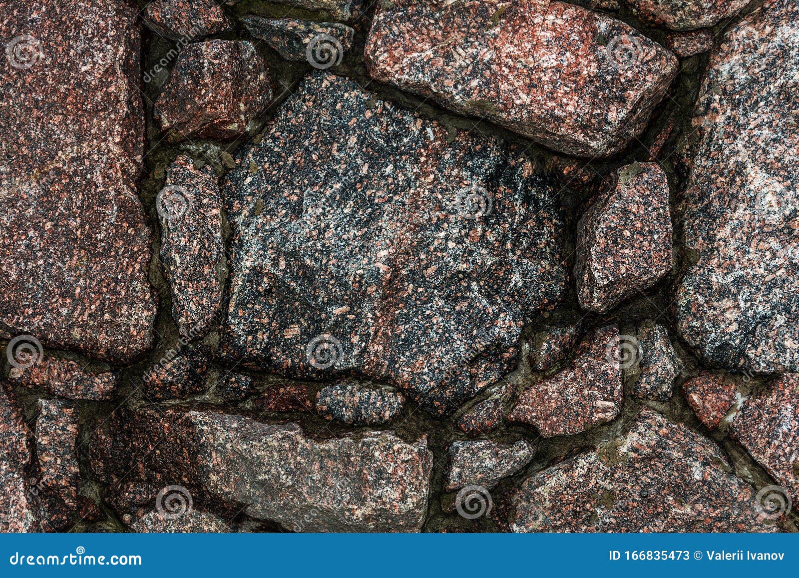 Fragment of a Stone Wall Made of Natural Granite Stones Interspersed ...