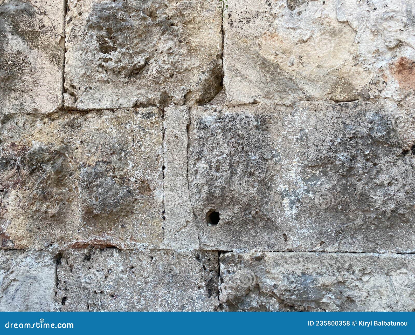 A Fragment of a Stone Wall Made of Roughly Hewn Stone Stock Photo ...
