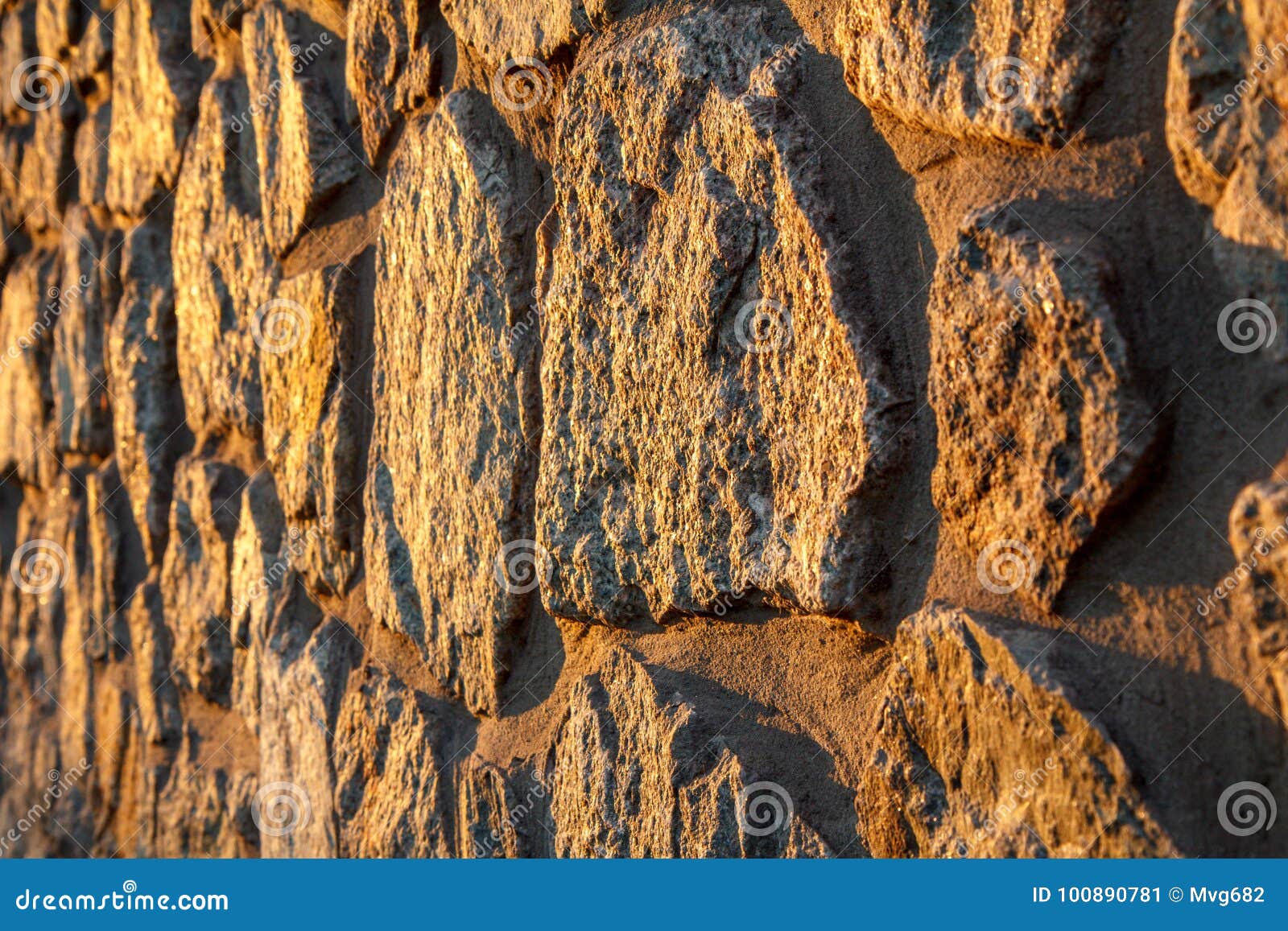 Fragment of Sunlit Stone Wall. Side View Stock Image - Image of rustic ...