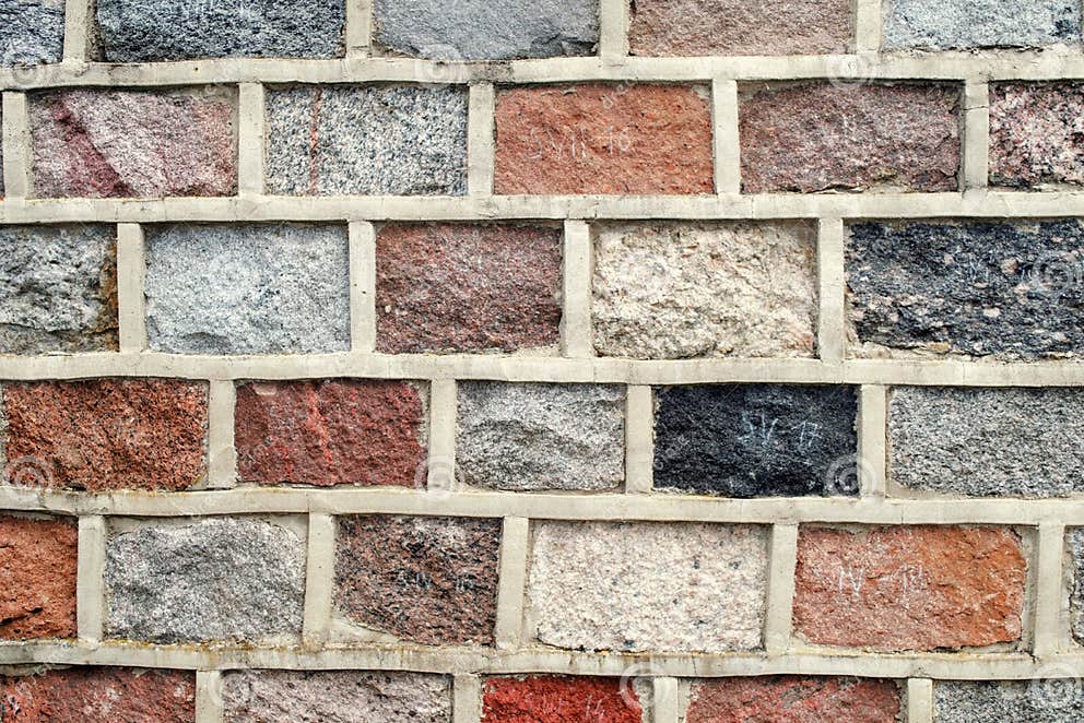 A Fragment of a Wall Structure Made of Multi-colored Stone Bricks Stock ...