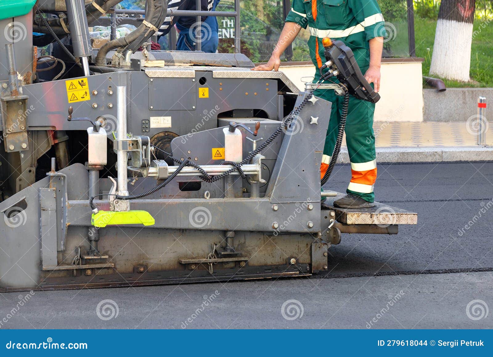 A Fragment of the Work of an Industrial Asphalt Paver, an Engineer ...