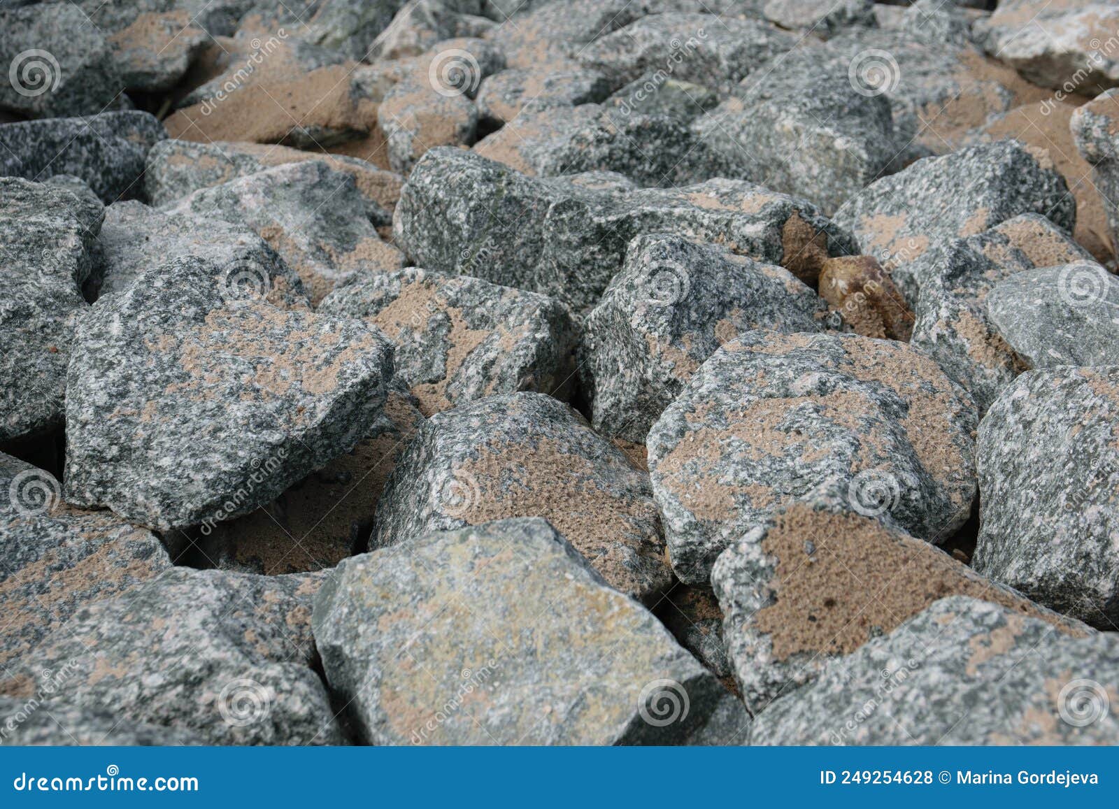 Fragments of Granite on the River Bank. Abstract Texture Background ...