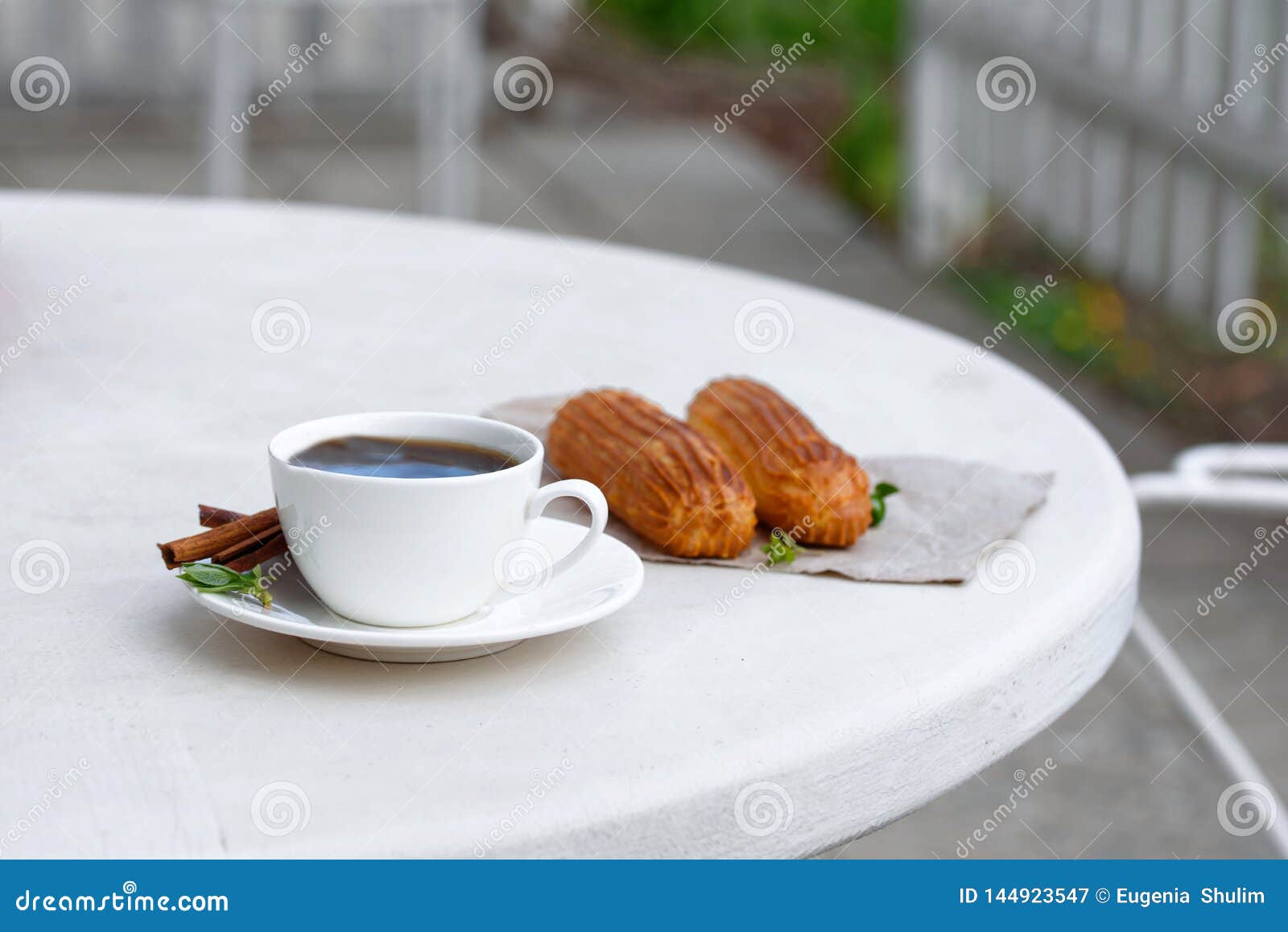 Fragrant Coffee with Eclairs in the Summer Cafe. Stock Image - Image of ...