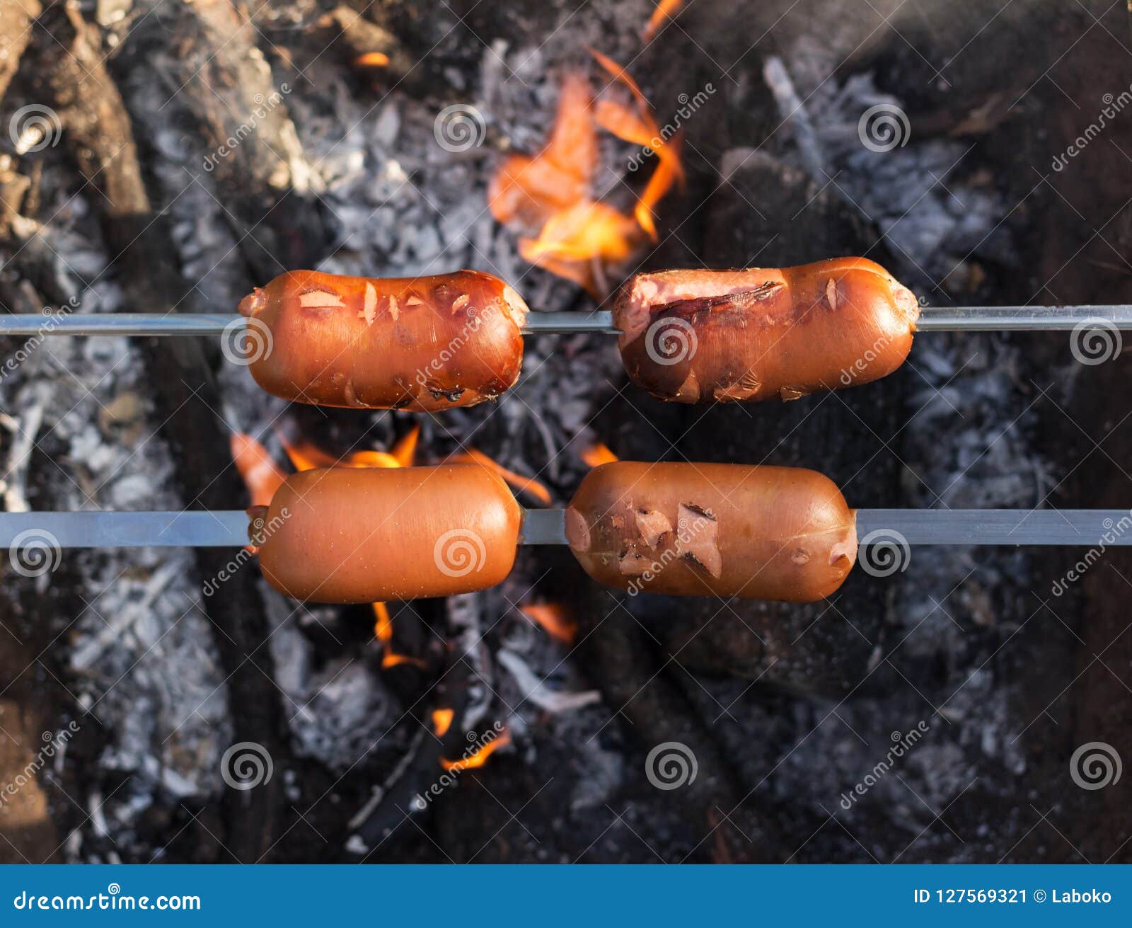 Fragrant Sausages Fried on a Skewer on Fire in the Garden Stock Image ...
