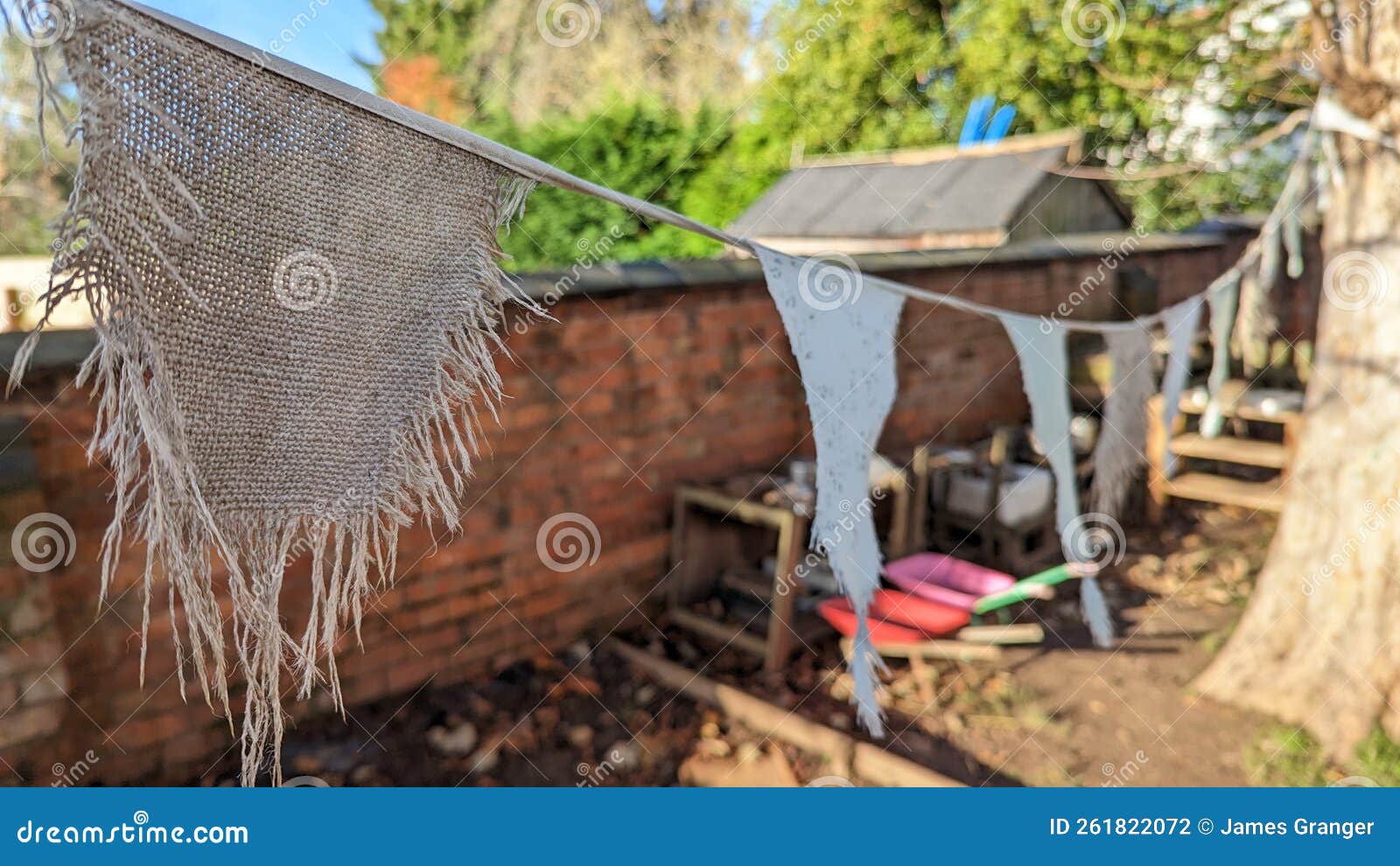 Fraid Worn Hessian Bunting Flags Hanging between Two Trees Stock Photo ...