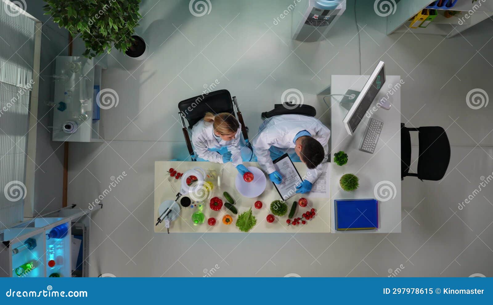 The Frame Above Shows Scientists Sitting in a Laboratory. a Woman is ...