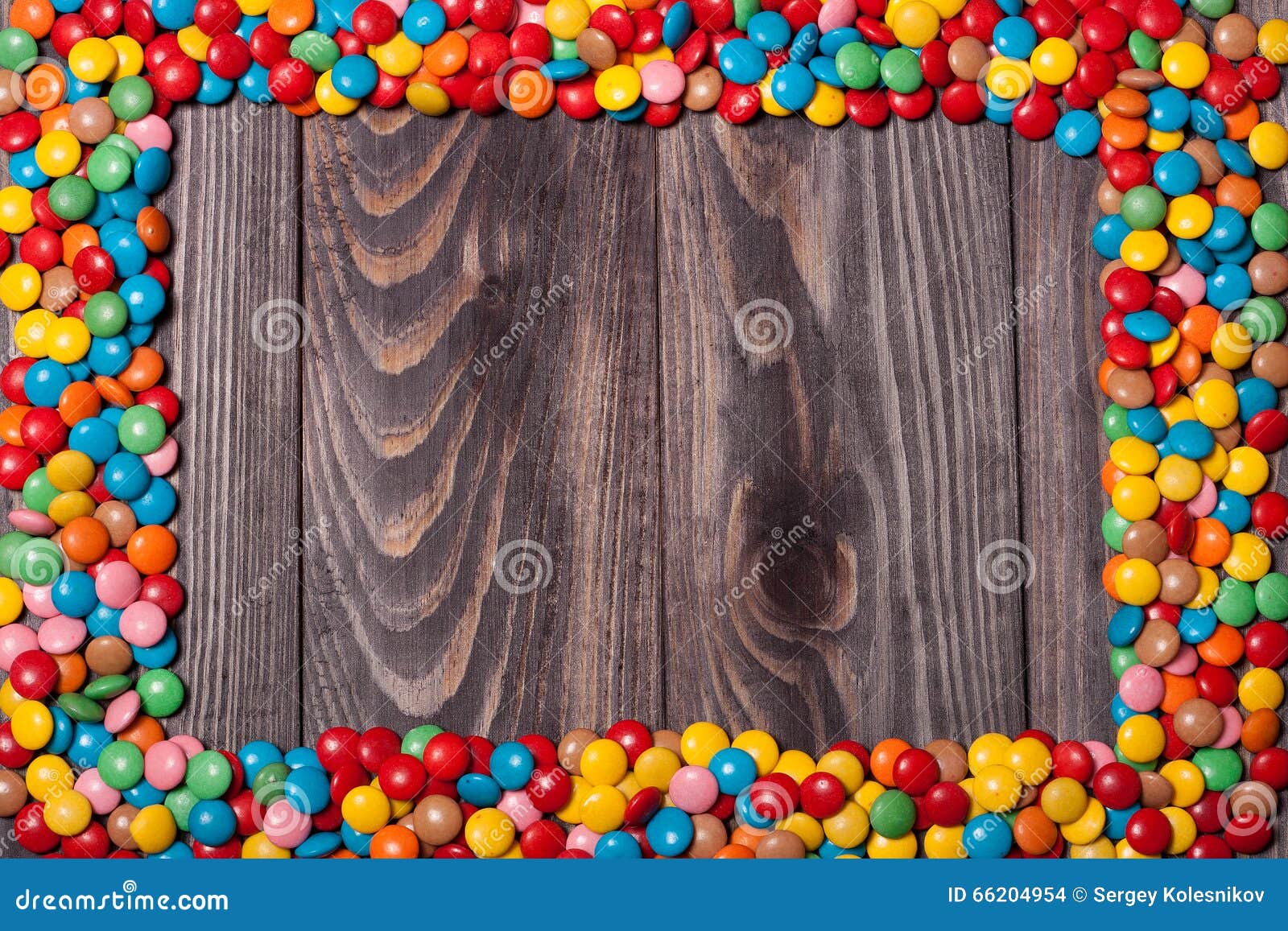 Frame of Colorful Candy on Wood Background Stock Photo - Image of round ...