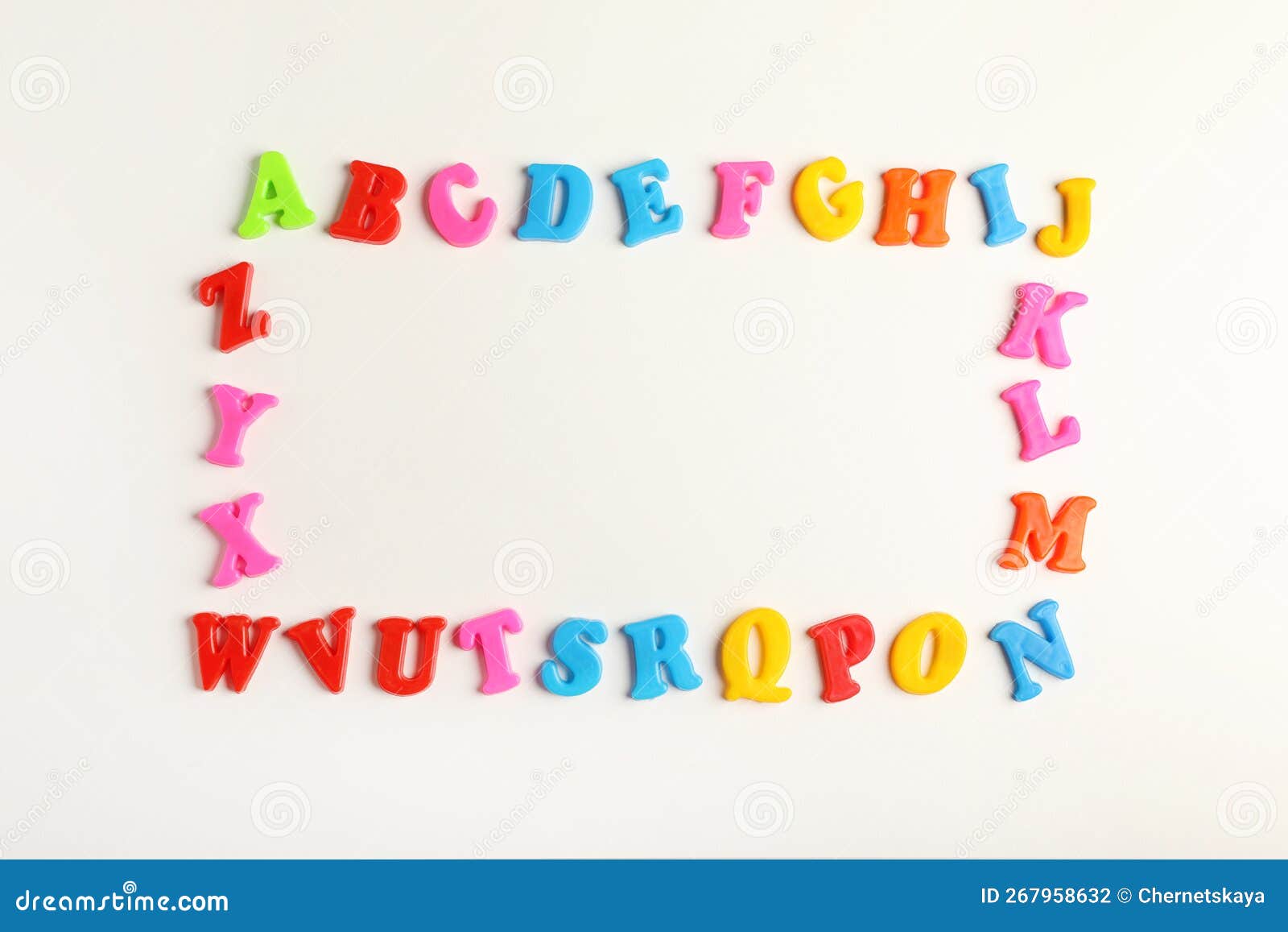 Frame of Colorful Magnetic Letters on White Background, Flat Lay with ...