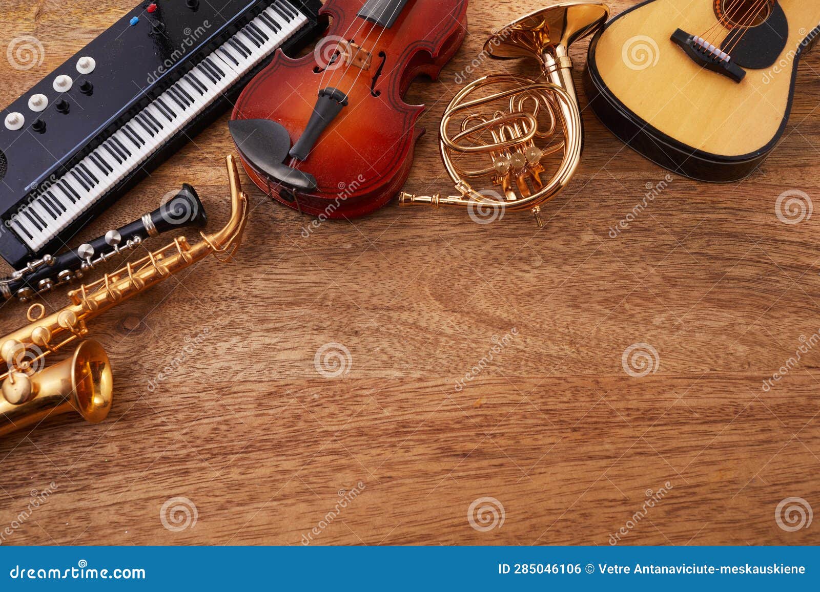 Frame of Different Musical Instruments on Wooden Background Stock Photo ...