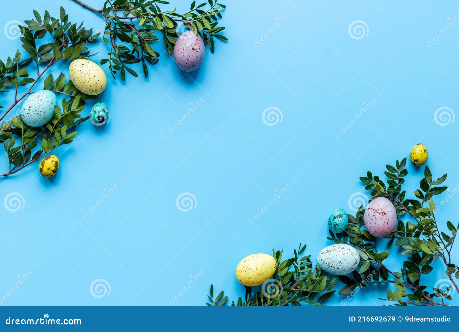 Frame of Easter Eggs with Spring Branches and Green Leaves. Veiw from ...