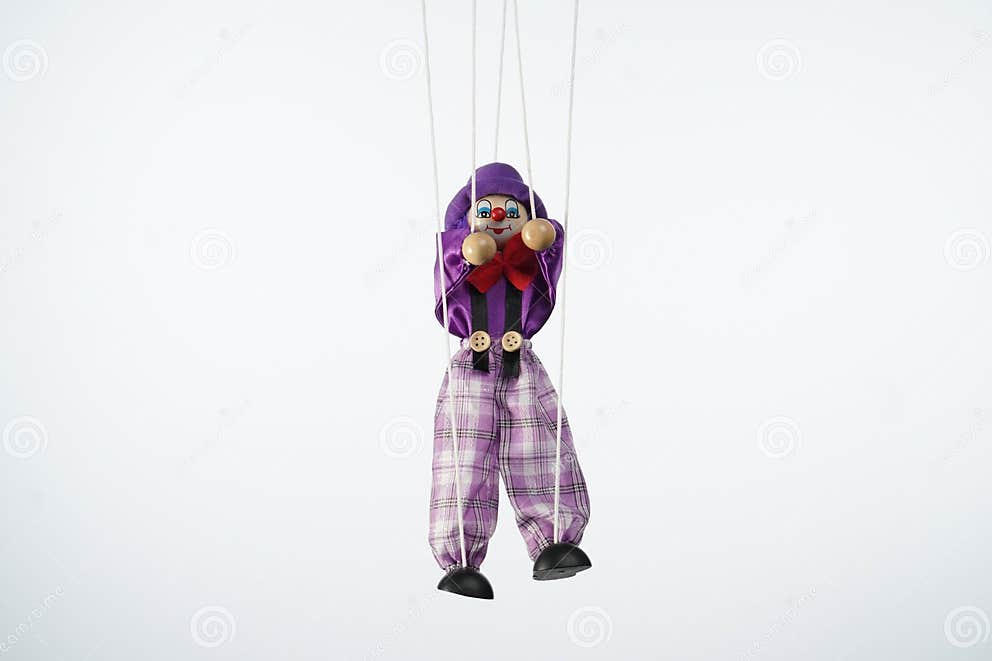 The Frame Features a Puppet in a White Background, a Marionette that ...