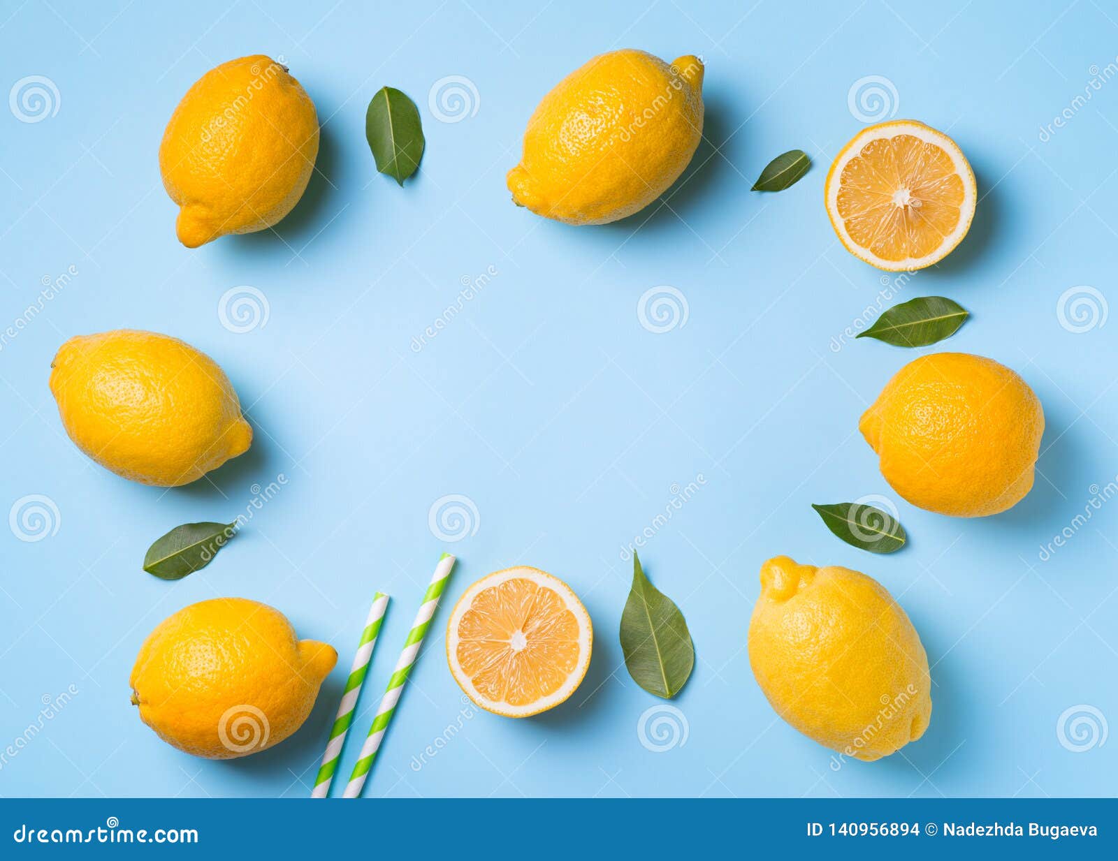 Frame of Half and Full Lemons on Blue Background Stock Photo - Image of ...