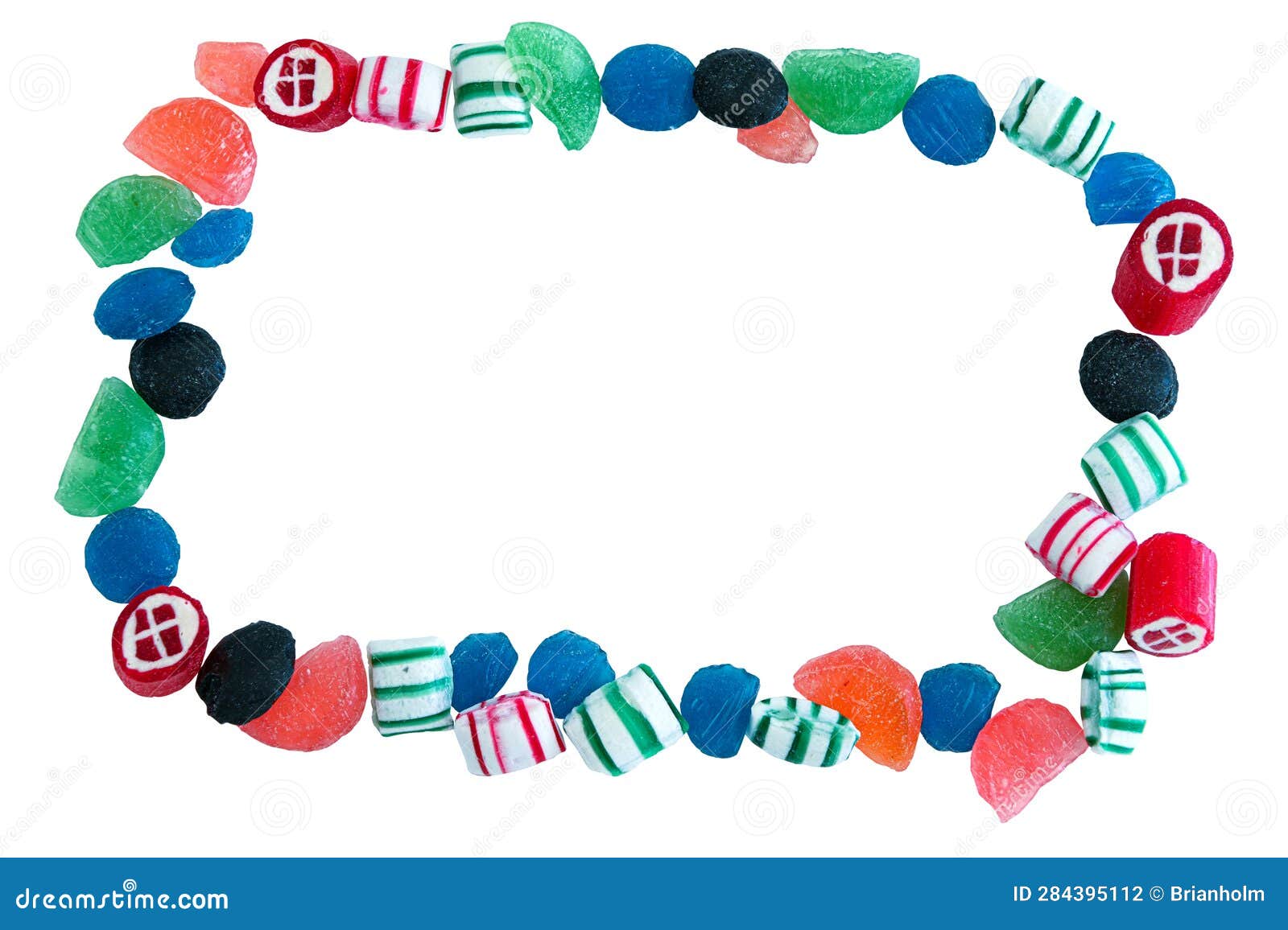 Frame of Delicious Candy Spread Out on White Background with Copy Space ...