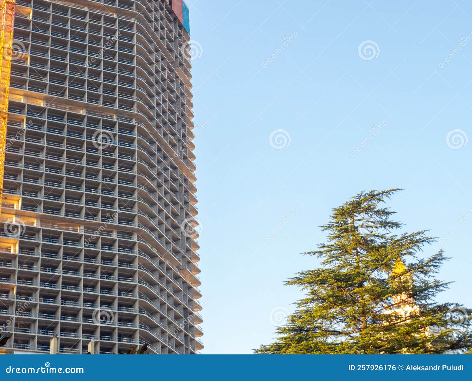 The Frame of a High-rise Building Under Construction. Reinforced ...