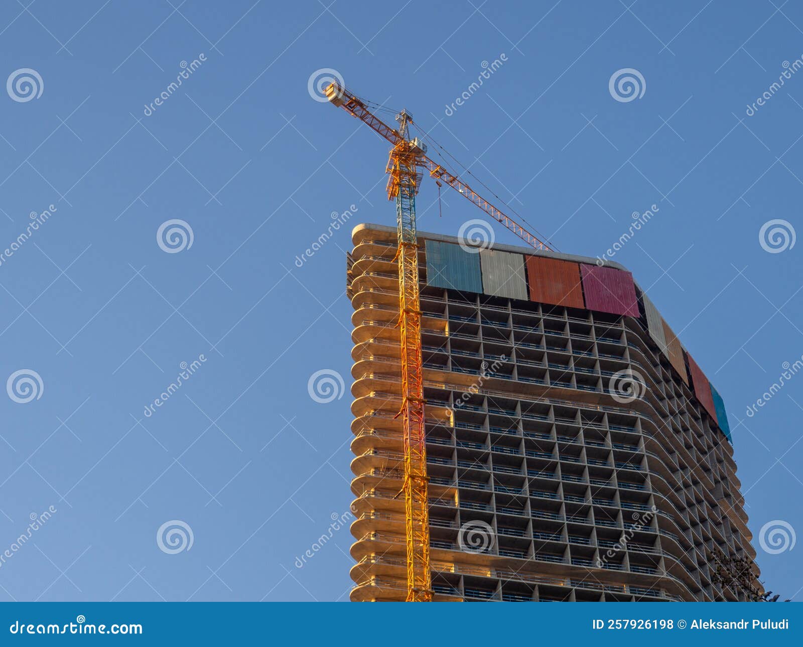 The Frame of a High-rise Building Under Construction. Reinforced ...