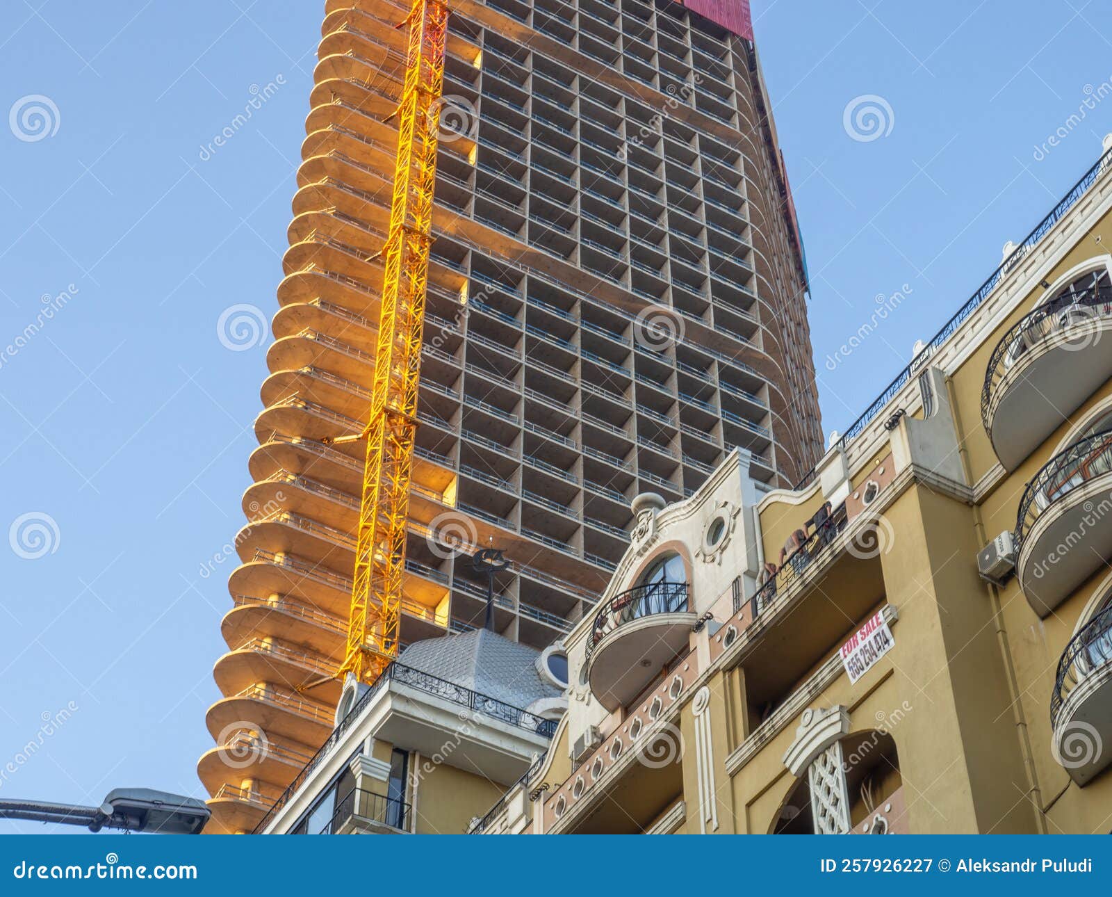 The Frame of a High-rise Building Under Construction. Reinforced ...