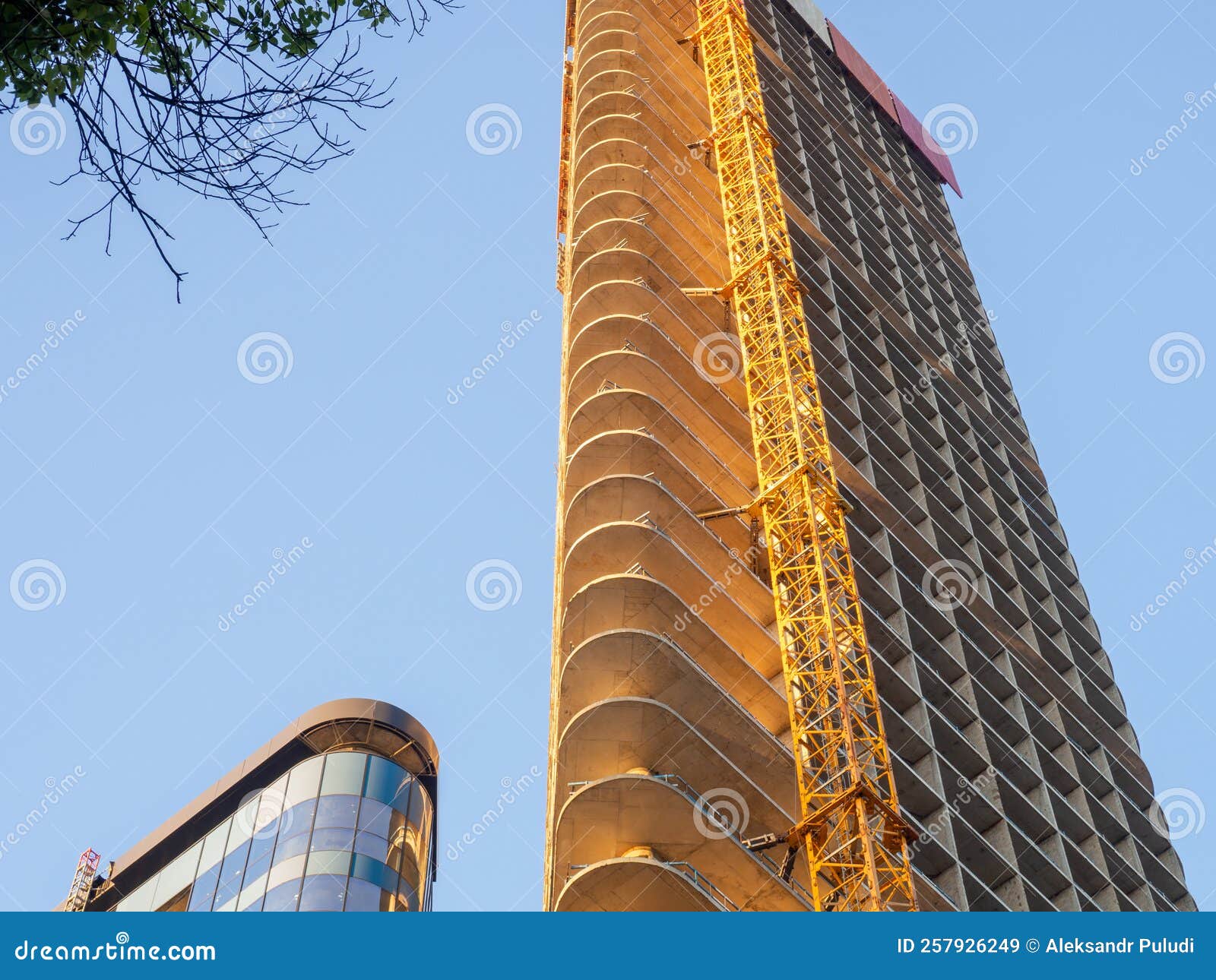 The Frame of a High-rise Building Under Construction. Reinforced ...