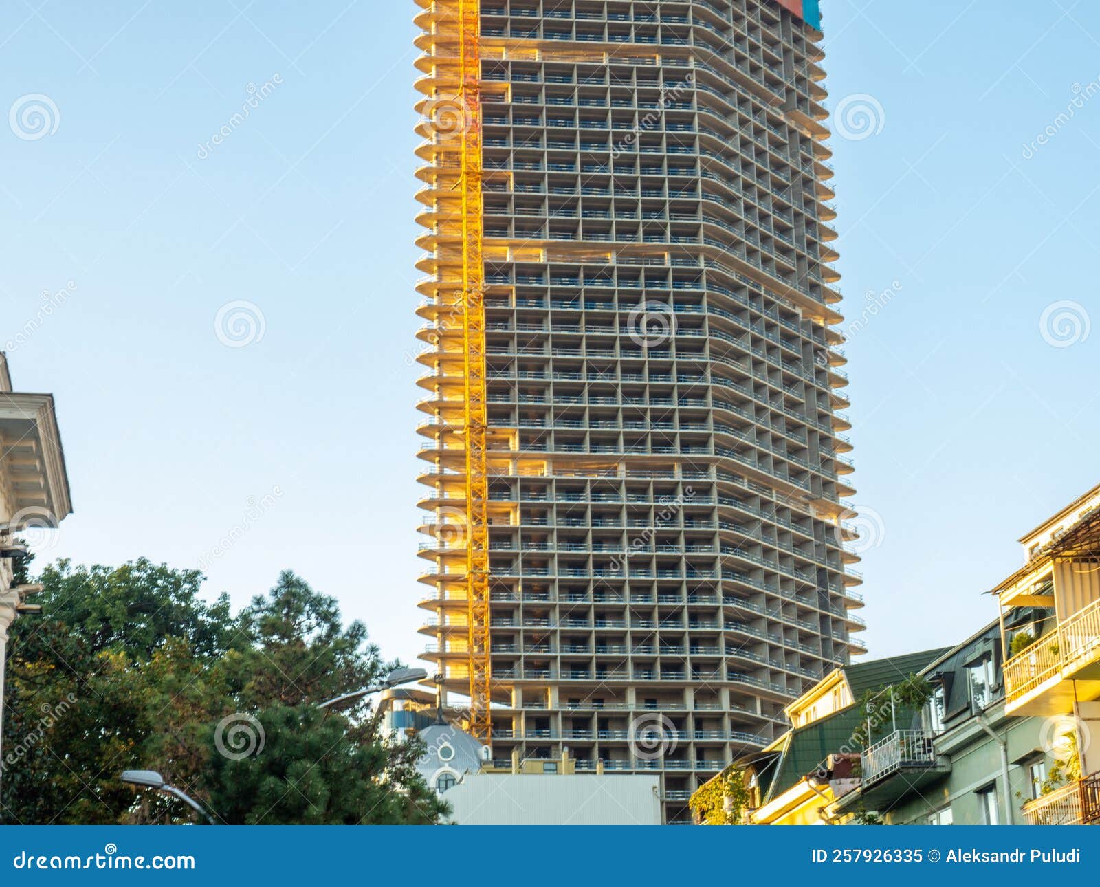 The Frame of a High-rise Building Under Construction. Reinforced ...
