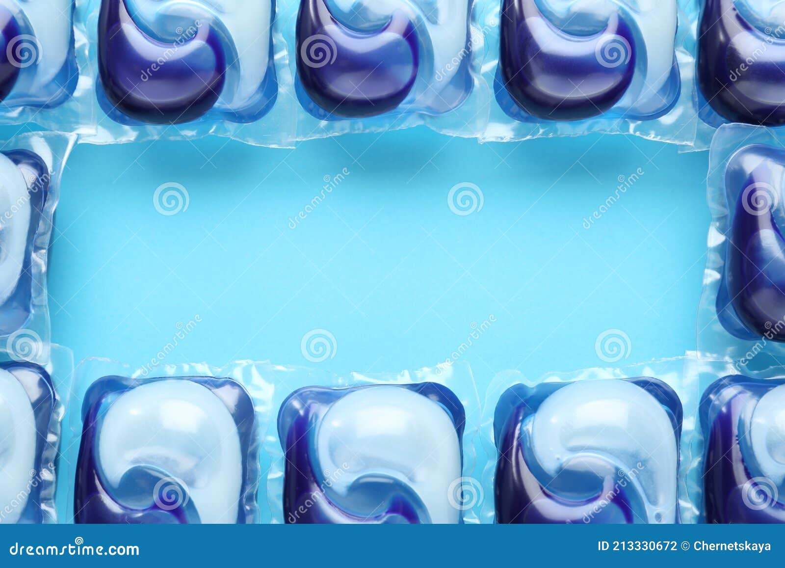 Frame of Laundry Capsules on Turquoise Background, Flat Lay. Space for ...