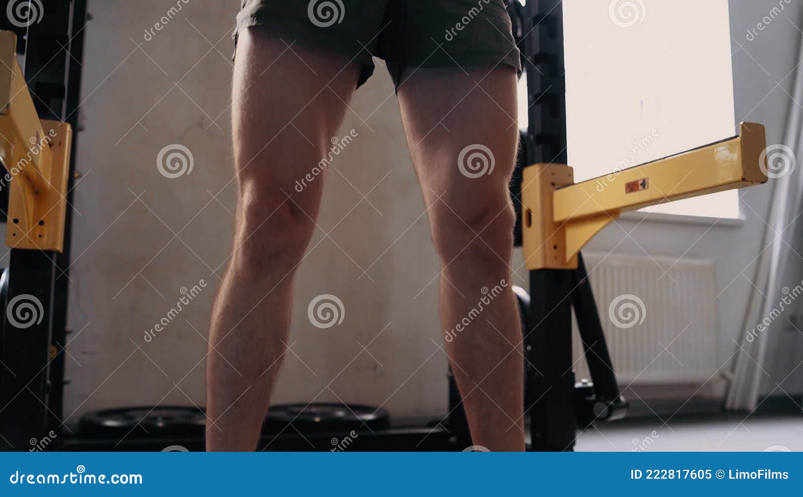 The Frame of the Legs while Performing Weights with the Weight Bar in ...