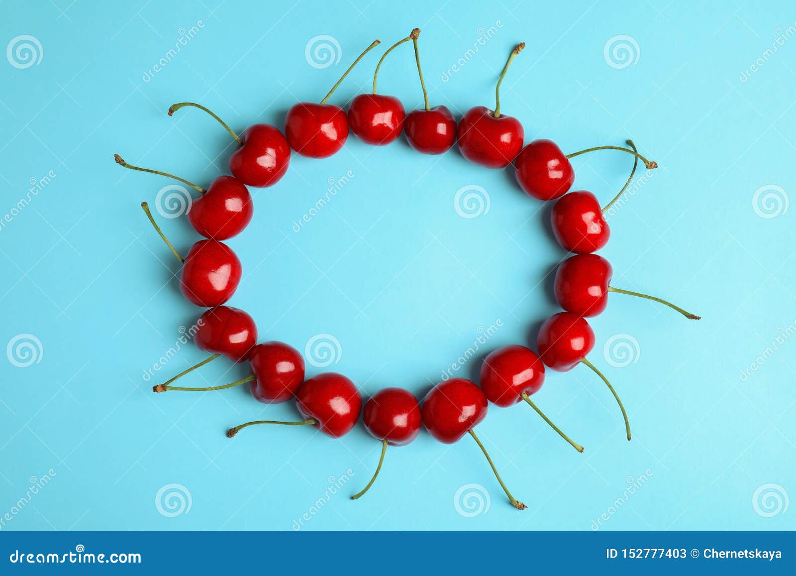 Frame Made of Sweet Cherries on Light Blue Background. Space for Text ...