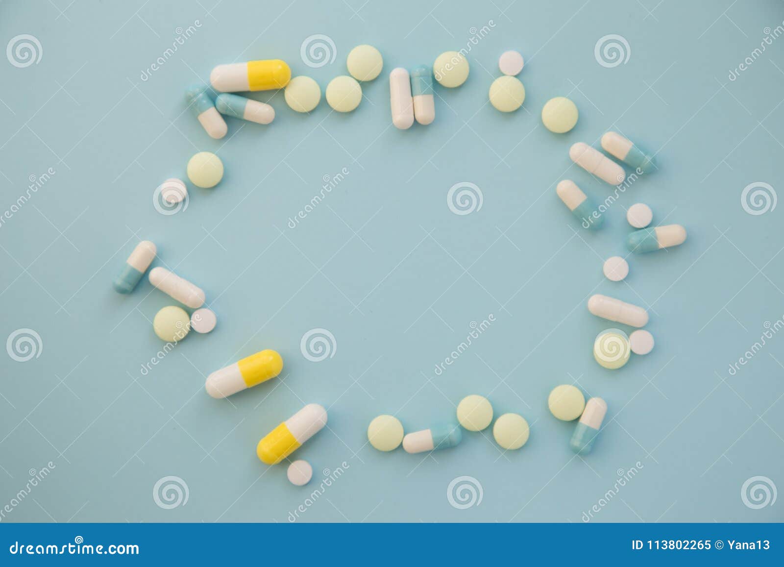 Frame from Multi Colored Pills and Capsules on Blue Background. Stock ...