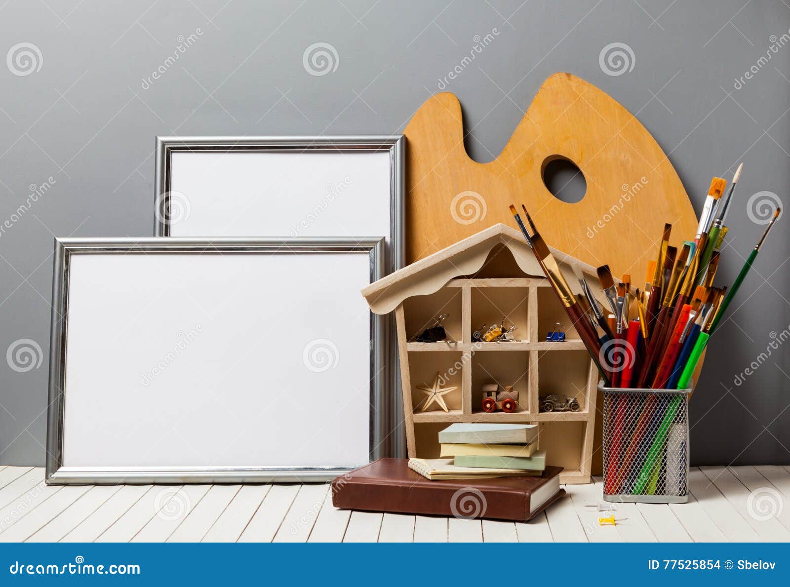 Frame and paintbrushes stock photo. Image of palette - 77525854