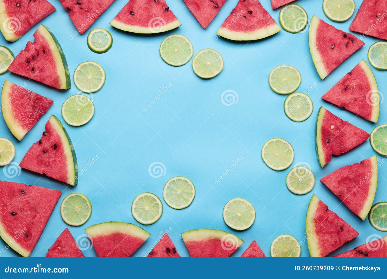 Frame of Tasty Sliced Watermelon and Limes on Light Blue Background ...