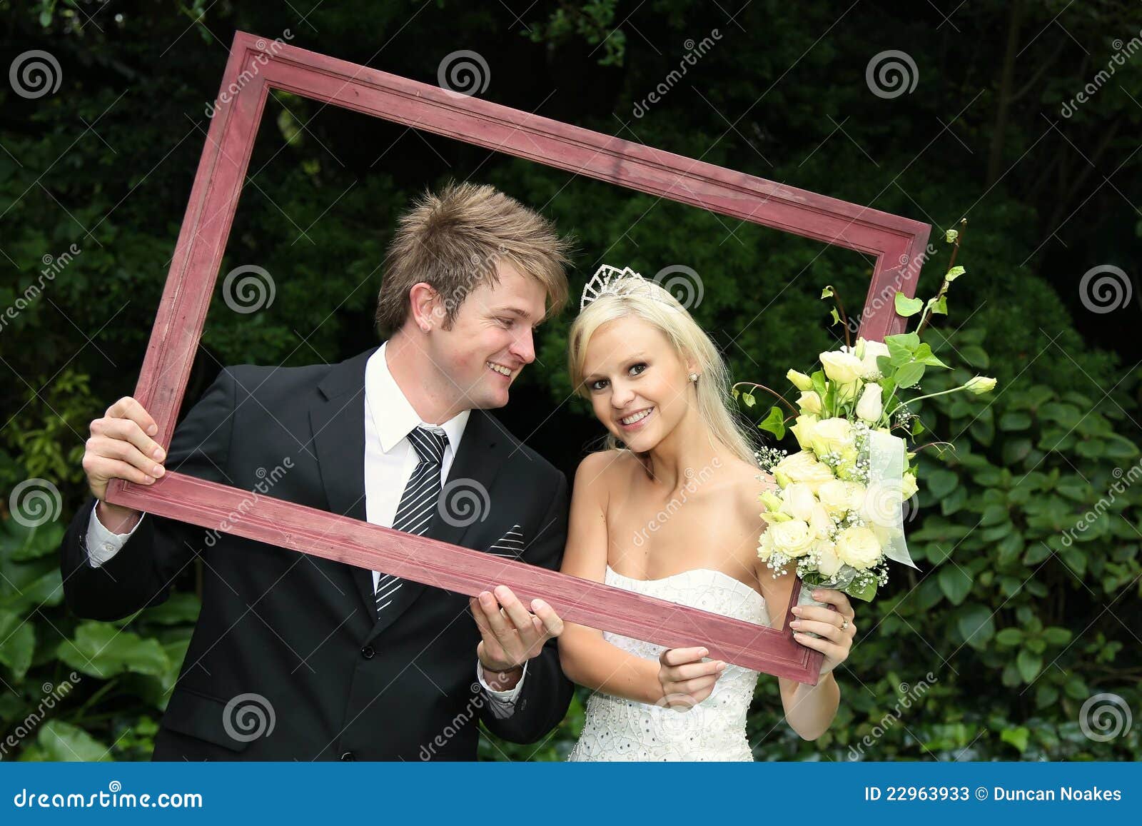 Framed Happy Wedding Couple Stock Image - Image of marriage, love: 22963933