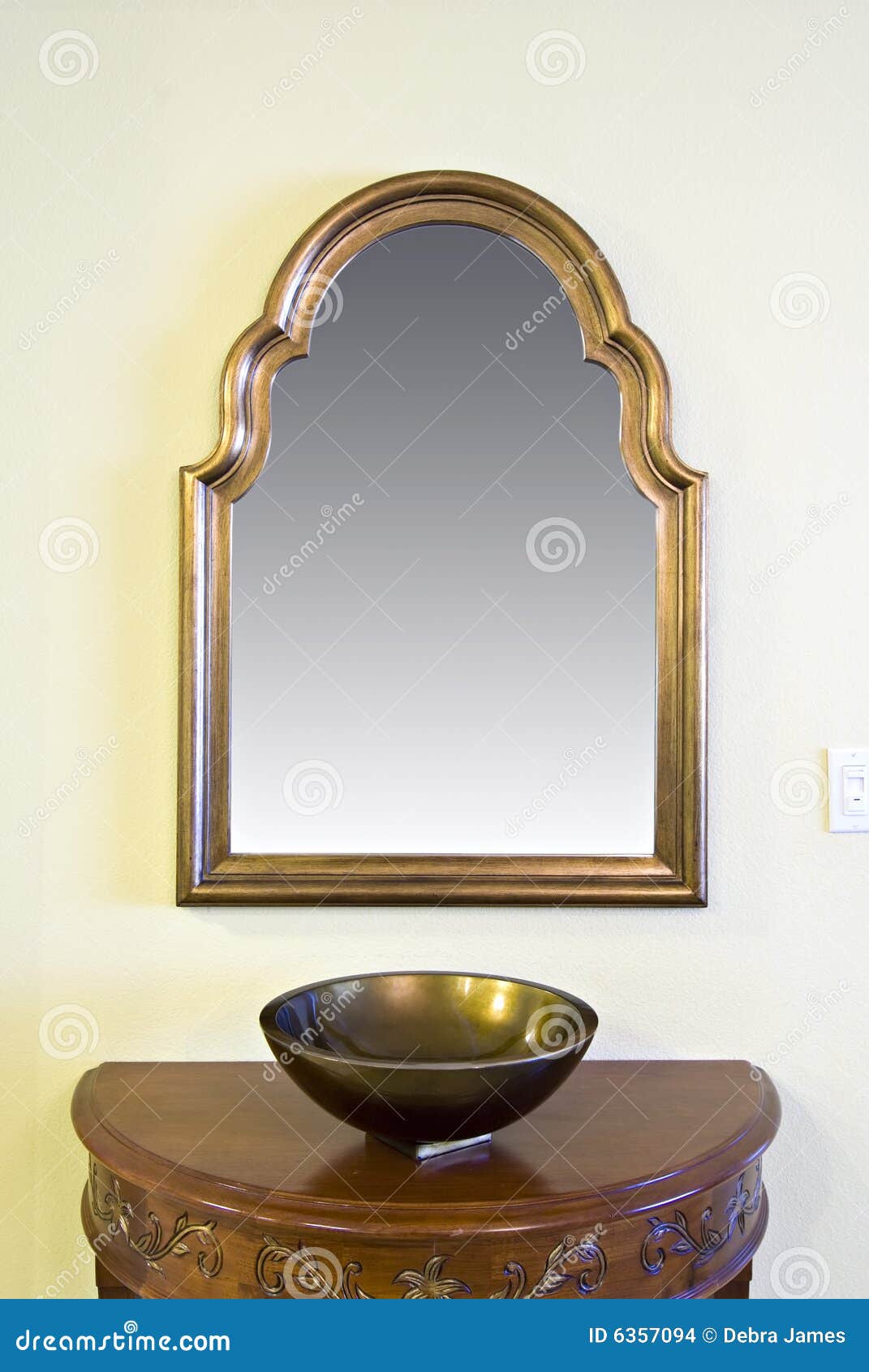 Framed Mirror with Decorative Bowl Stock Photo - Image of reflect ...