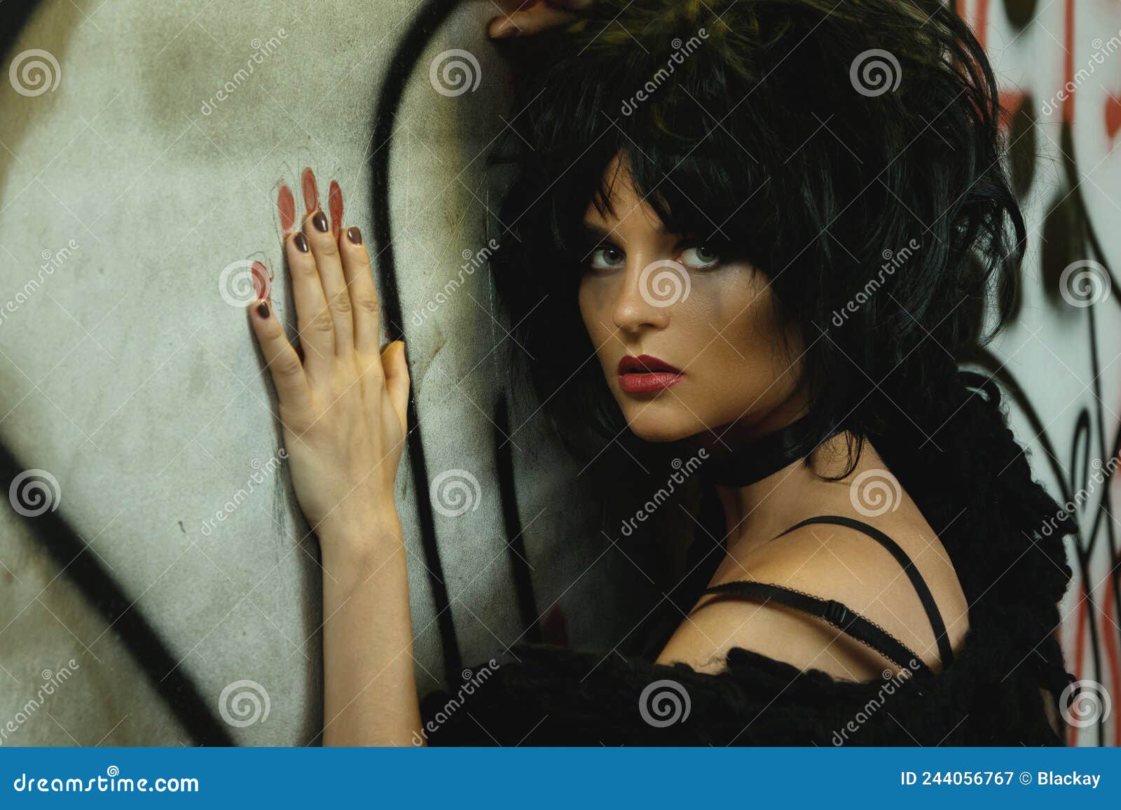 Freaky Woman in Dark Tunnel with Graffiti Stock Image - Image of ...