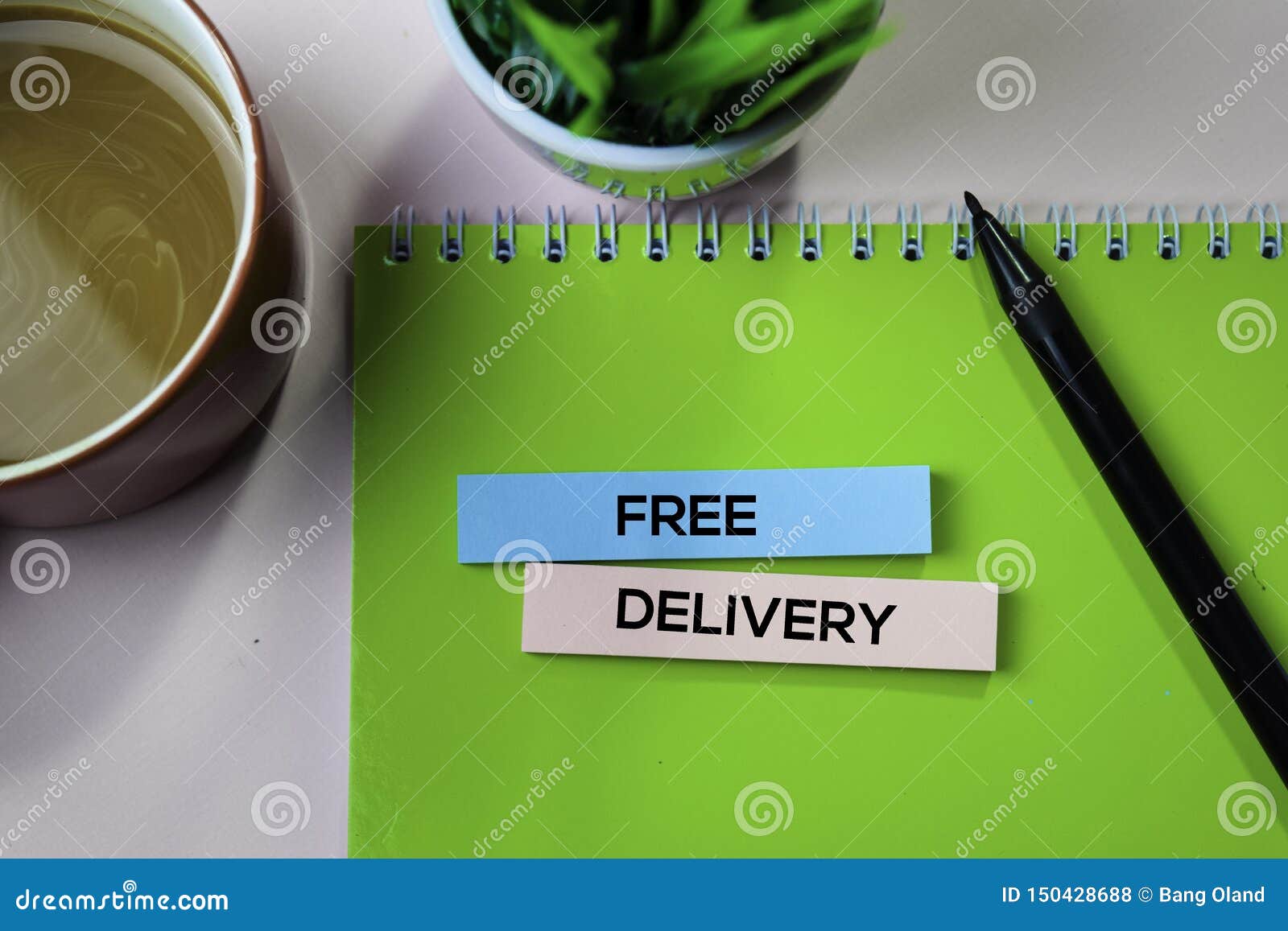 Free Delivery Text on Sticky Notes with Office Desk Concept Stock Photo ...
