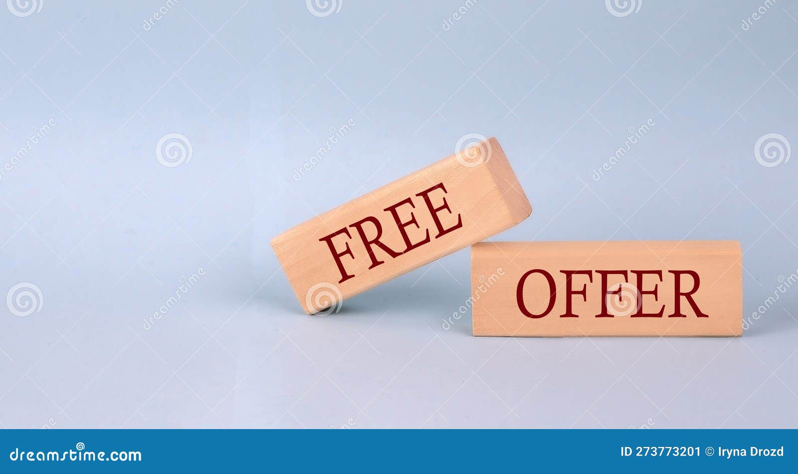 FREE OFFER Text on the Wooden Block, Blue Background Stock Image ...