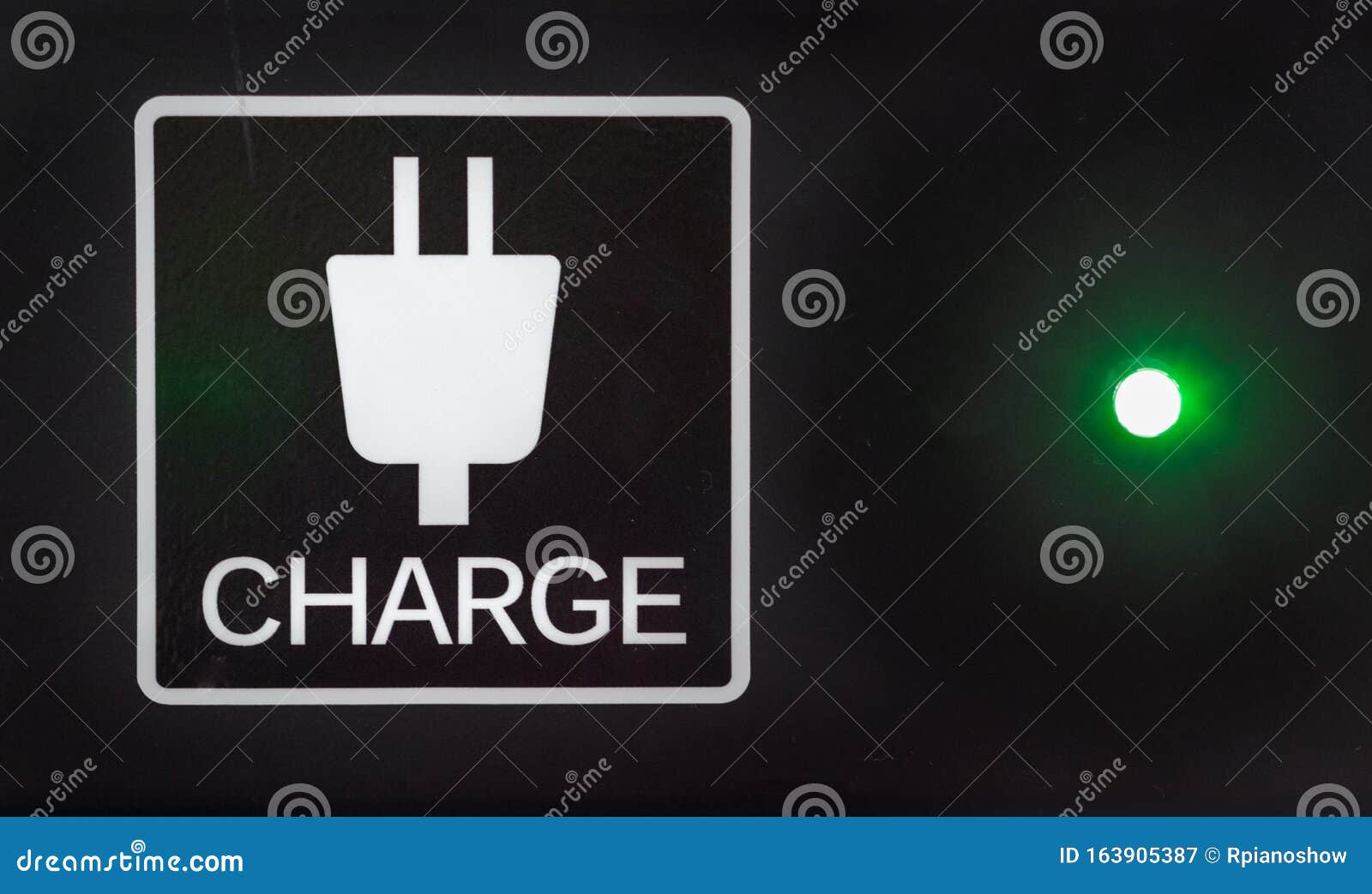 Free Public Mobile Charge Sign with a Green Light Stock Image - Image ...