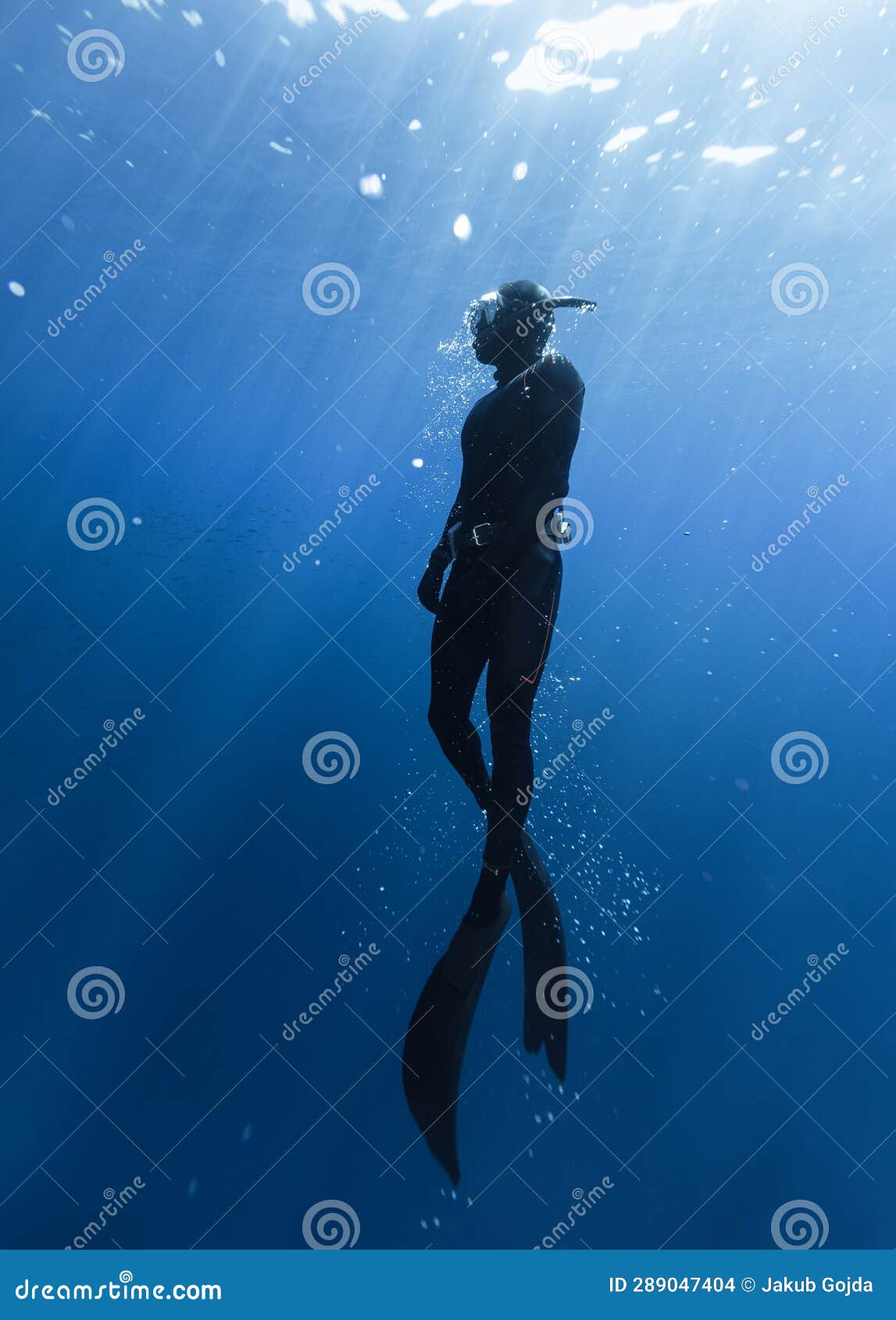 Freediver Swimming in Deep Sea with Sunrays Stock Photo - Image of ...