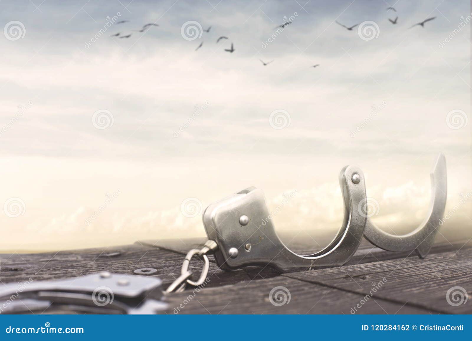 Freedom Concept with a Pair of Open Handcuffs Stock Photo - Image of ...