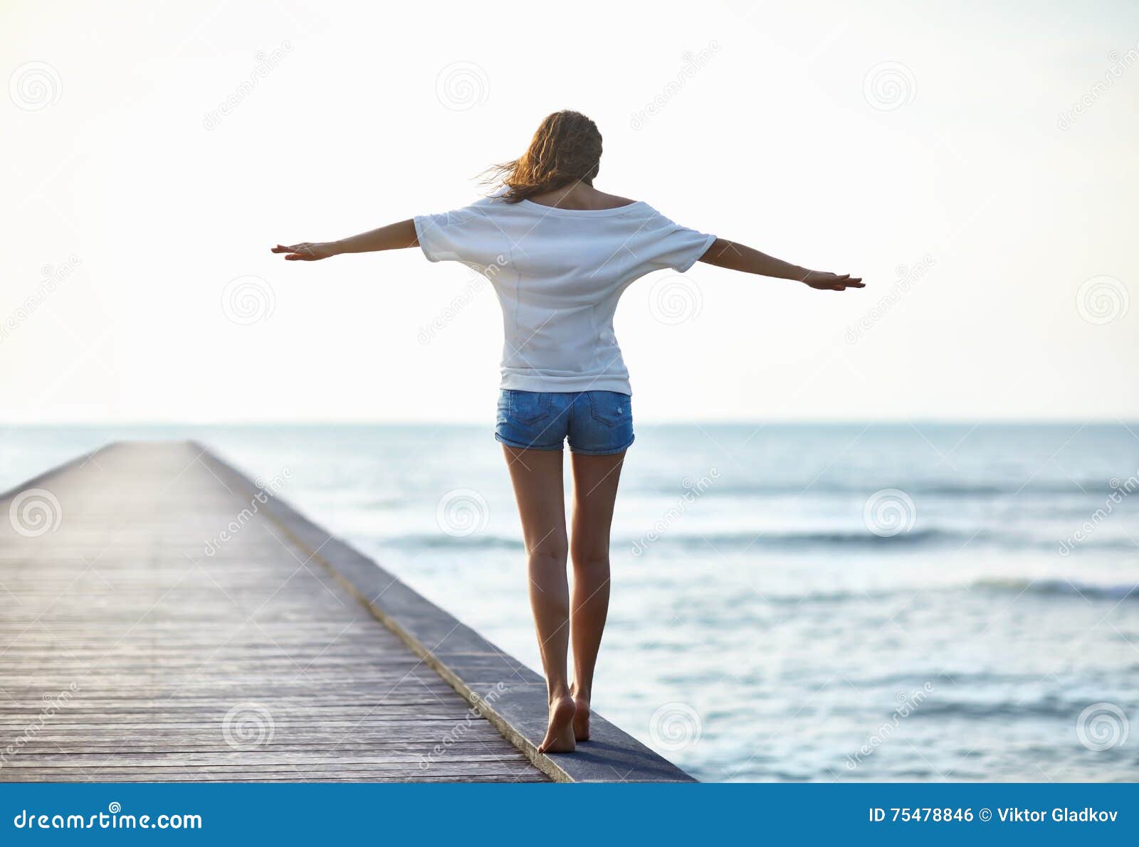 Freedom Girl Walking on Pier Stock Photo - Image of freedom, edge: 75478846