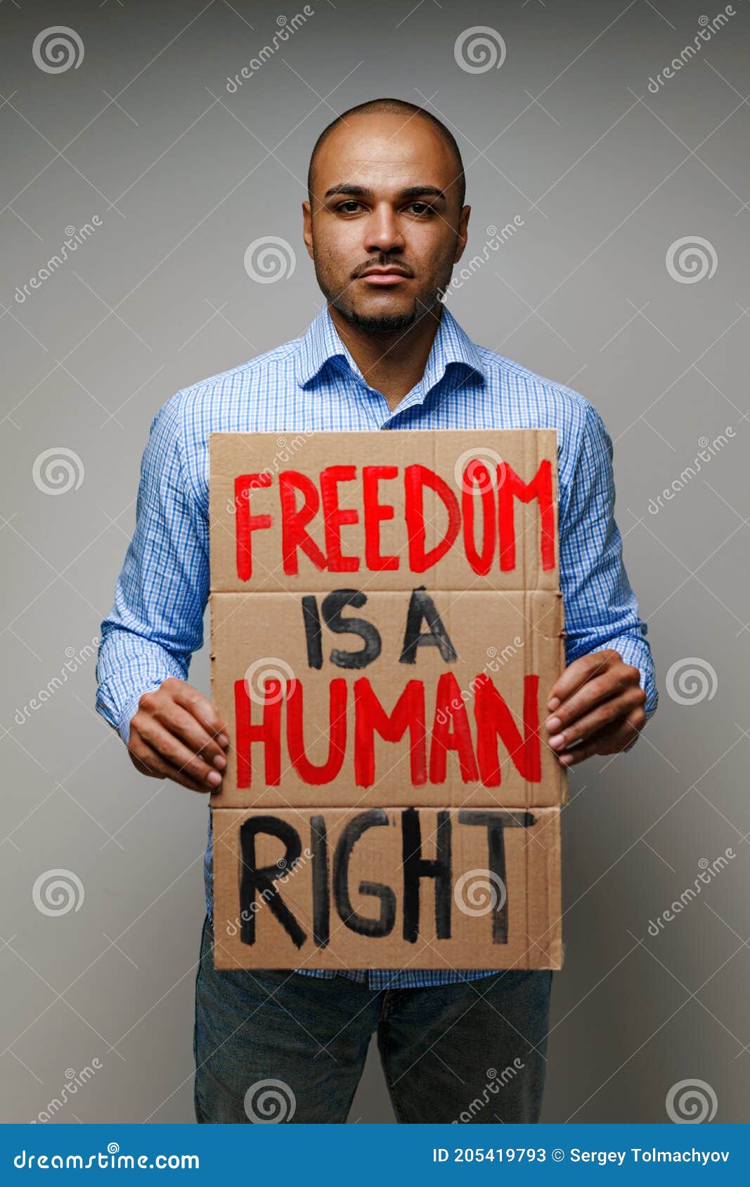 `Freedom is a Human Right` Placard in Hands of Protester Man Stock ...