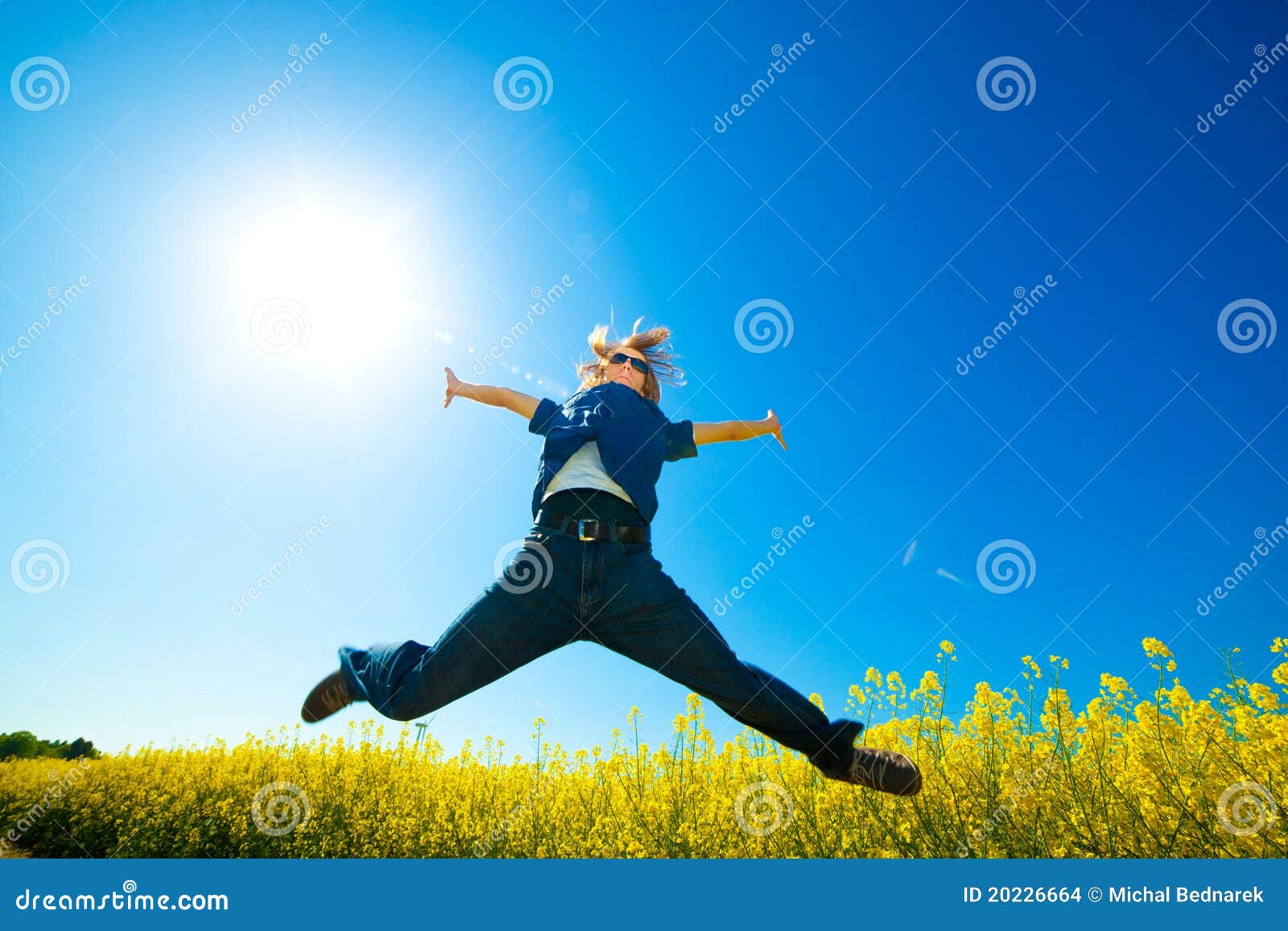 Freedom jump on the field stock photo. Image of people - 20226664