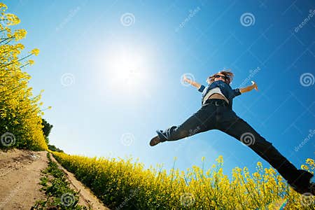 Freedom jump on the field stock image. Image of lifestyle - 20226677