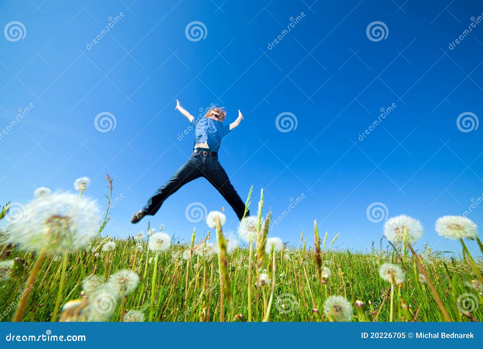Freedom jump on the field stock image. Image of nature - 20226705