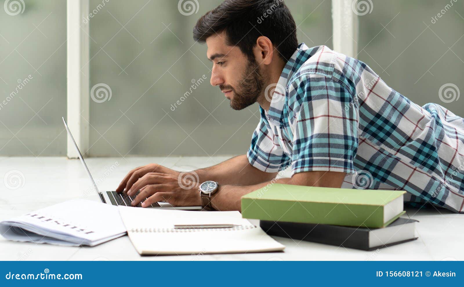 Freelance Businessman Working at Home while Studying in University and ...