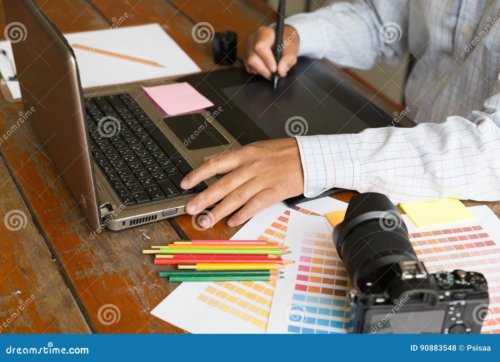 Freelance Graphic Designer Using Digital Tablet, Computer, Man W Stock ...