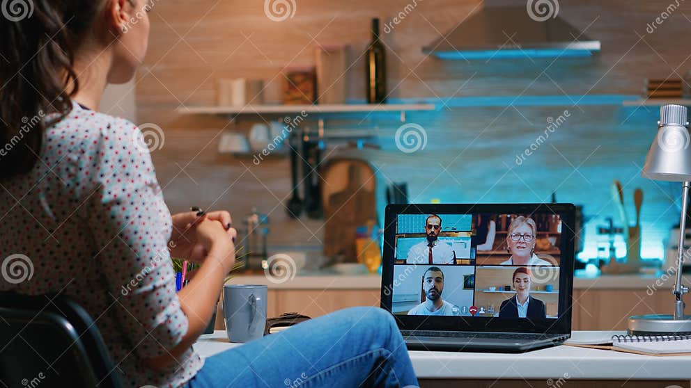 Freelancer Discussing with Partners Online Using Laptop Stock Image ...