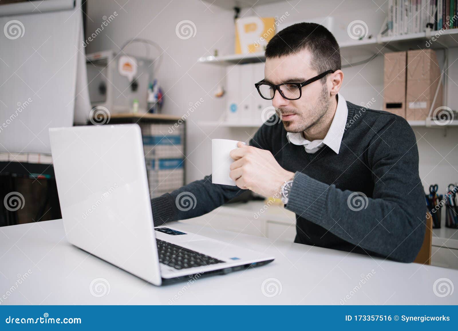 Freelancer Drinking Tea and Working in Office Stock Photo - Image of ...